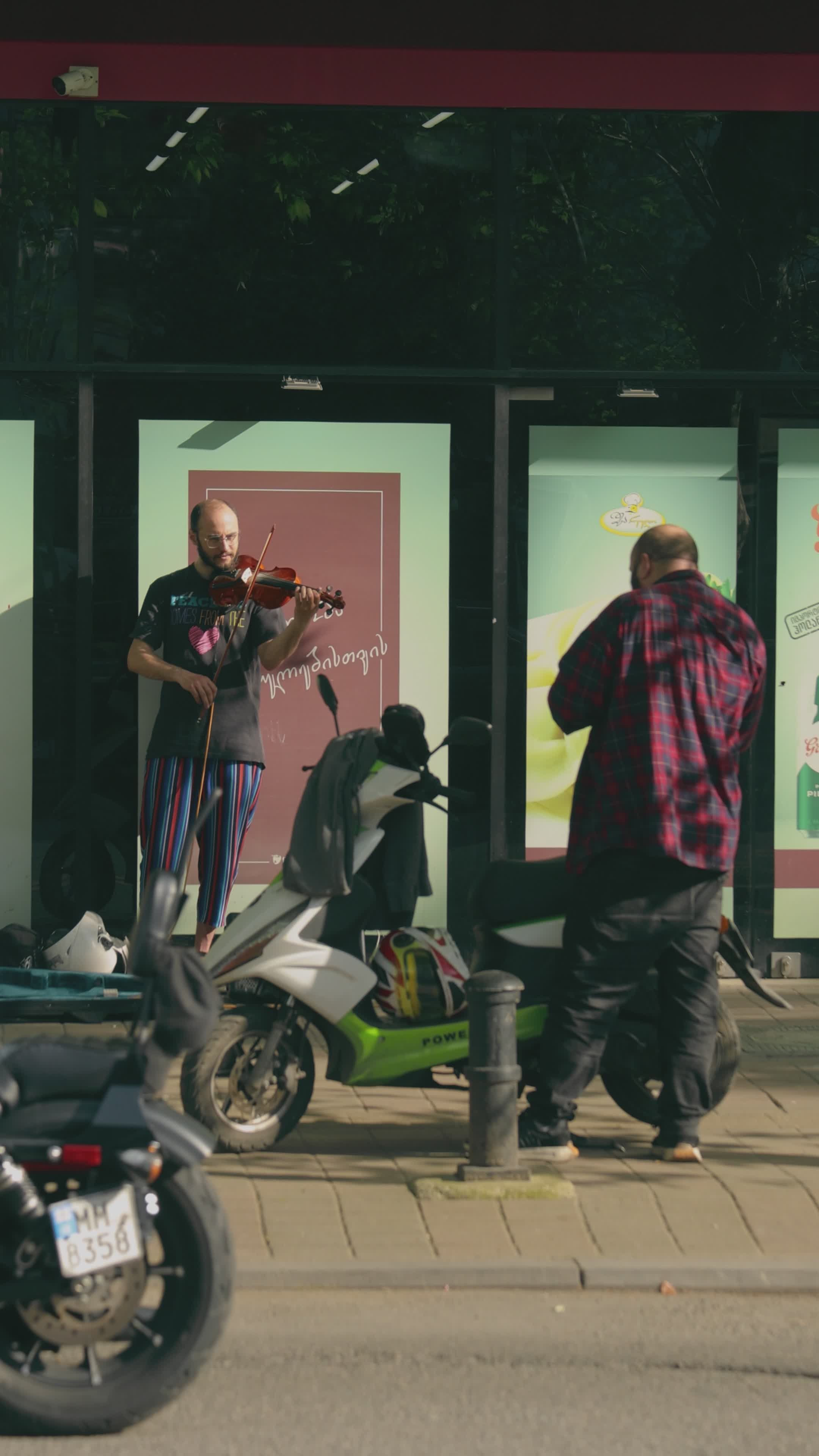 Street Musicians Perform at Bus Stop Free Stock Video Footage, Royalty ...