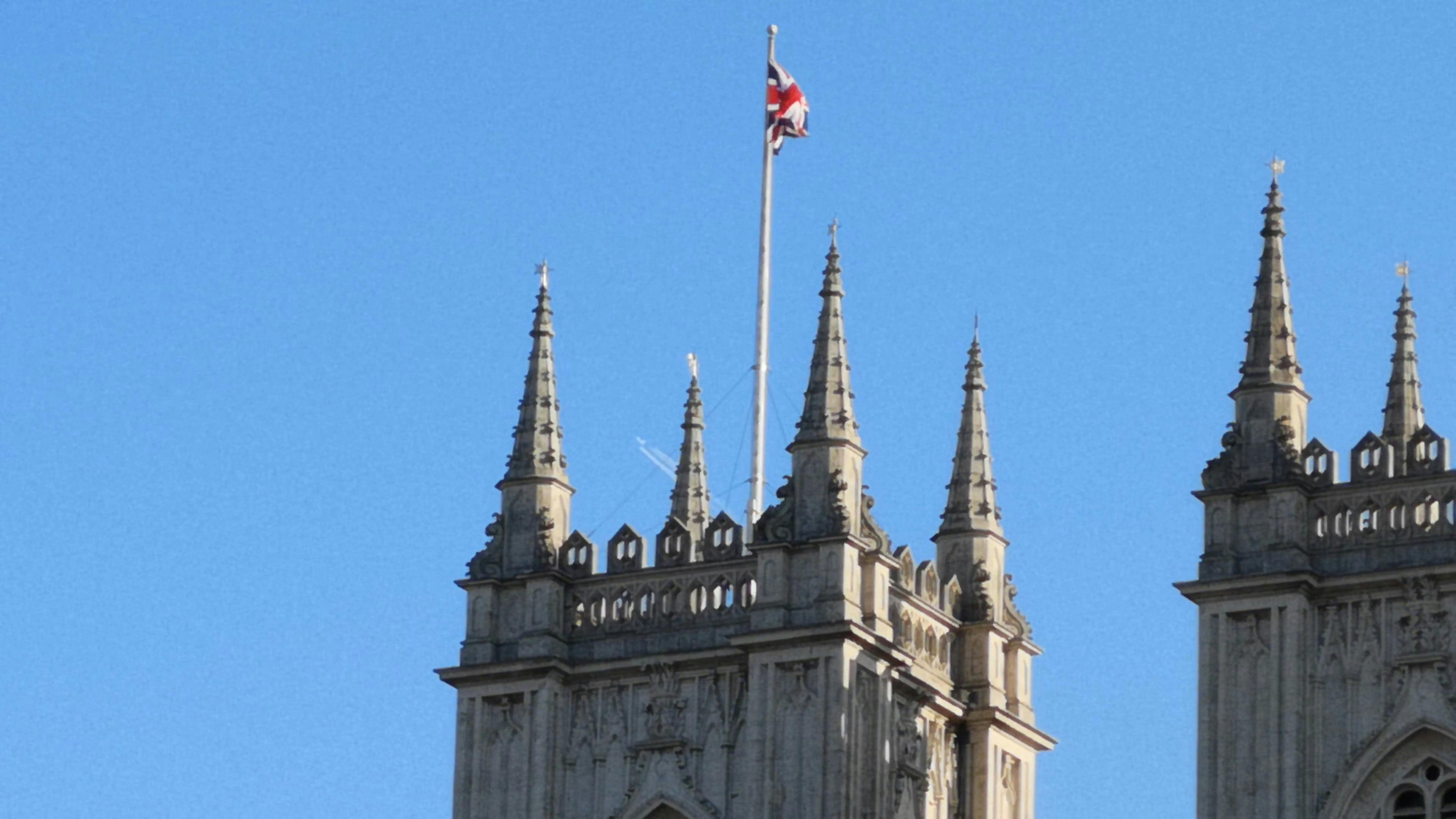 The British Flag Swaying In The Wind Atop A Flagpole Free Stock Video ...