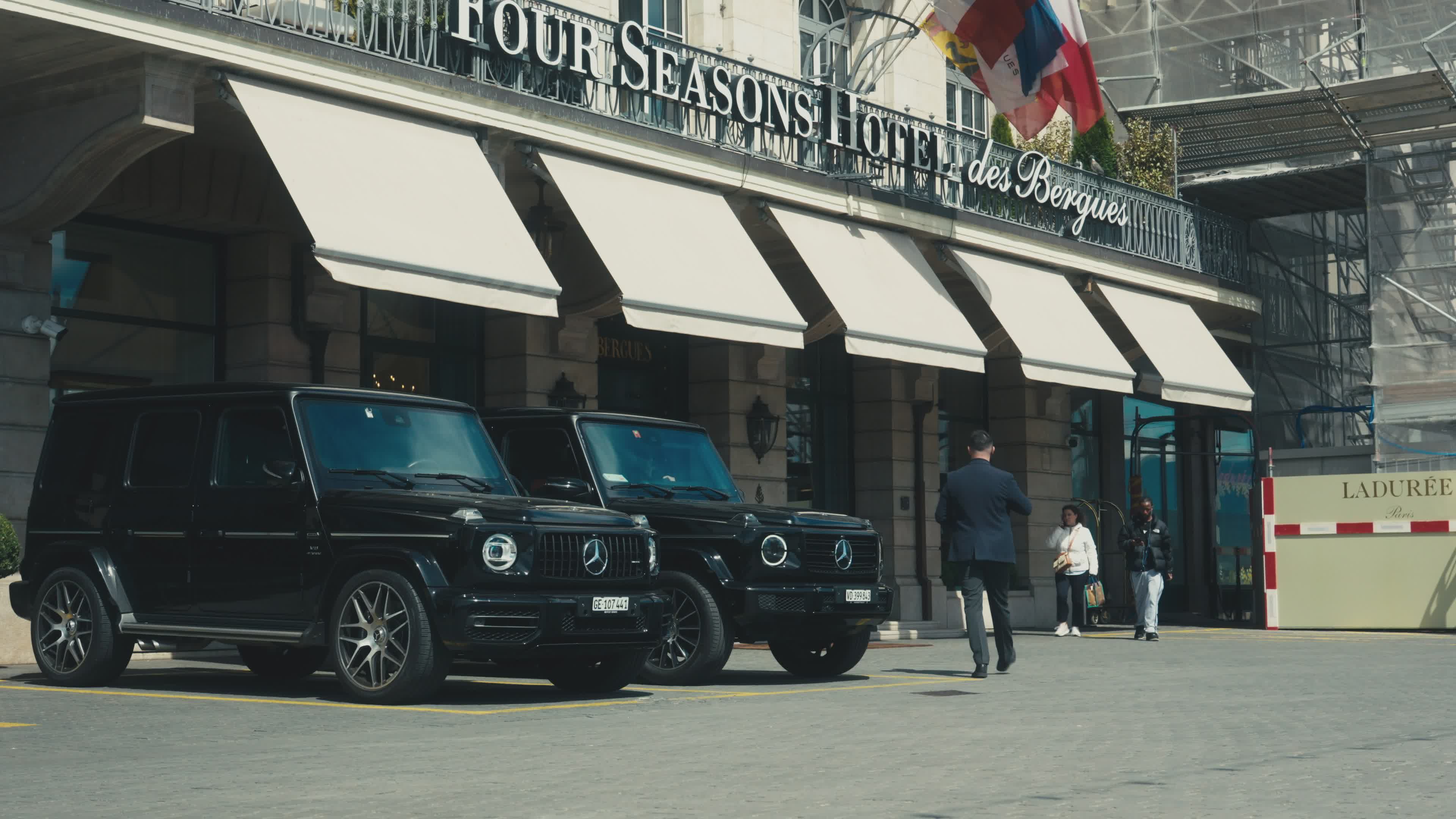 Luxury Cars Parked Outside Four Seasons Hotel Free Stock Video Footage ...