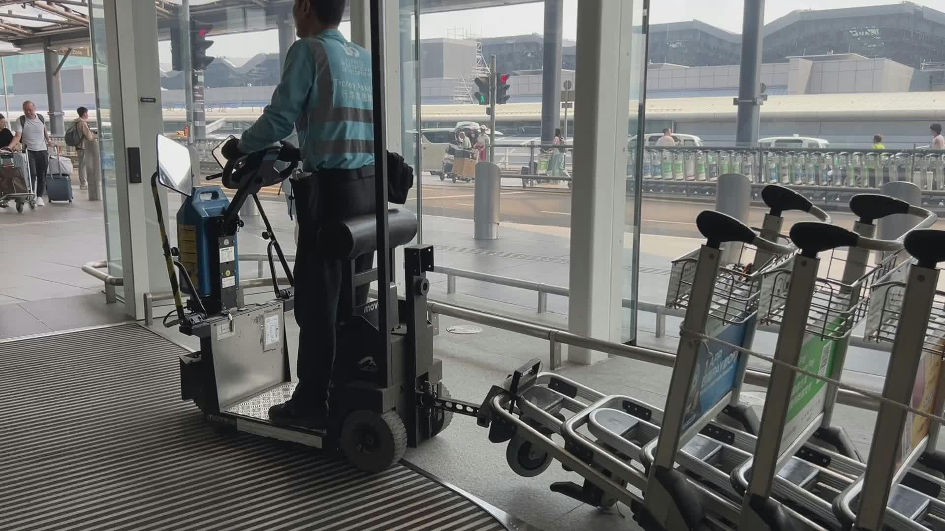 Efficient Luggage Cart Retrieval at Bustling Airport Free Stock Video ...