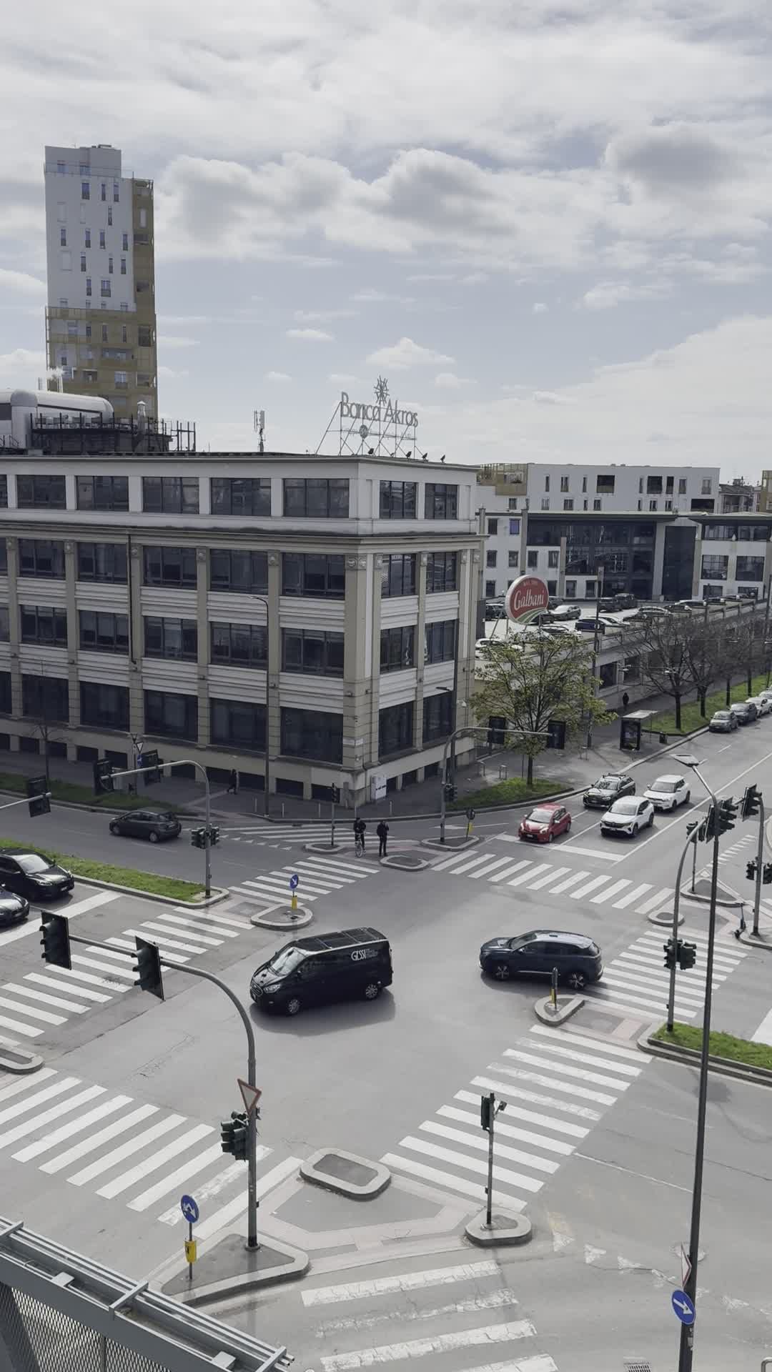 Busy Intersection in Milan with Traffic Movement Free Stock Video ...