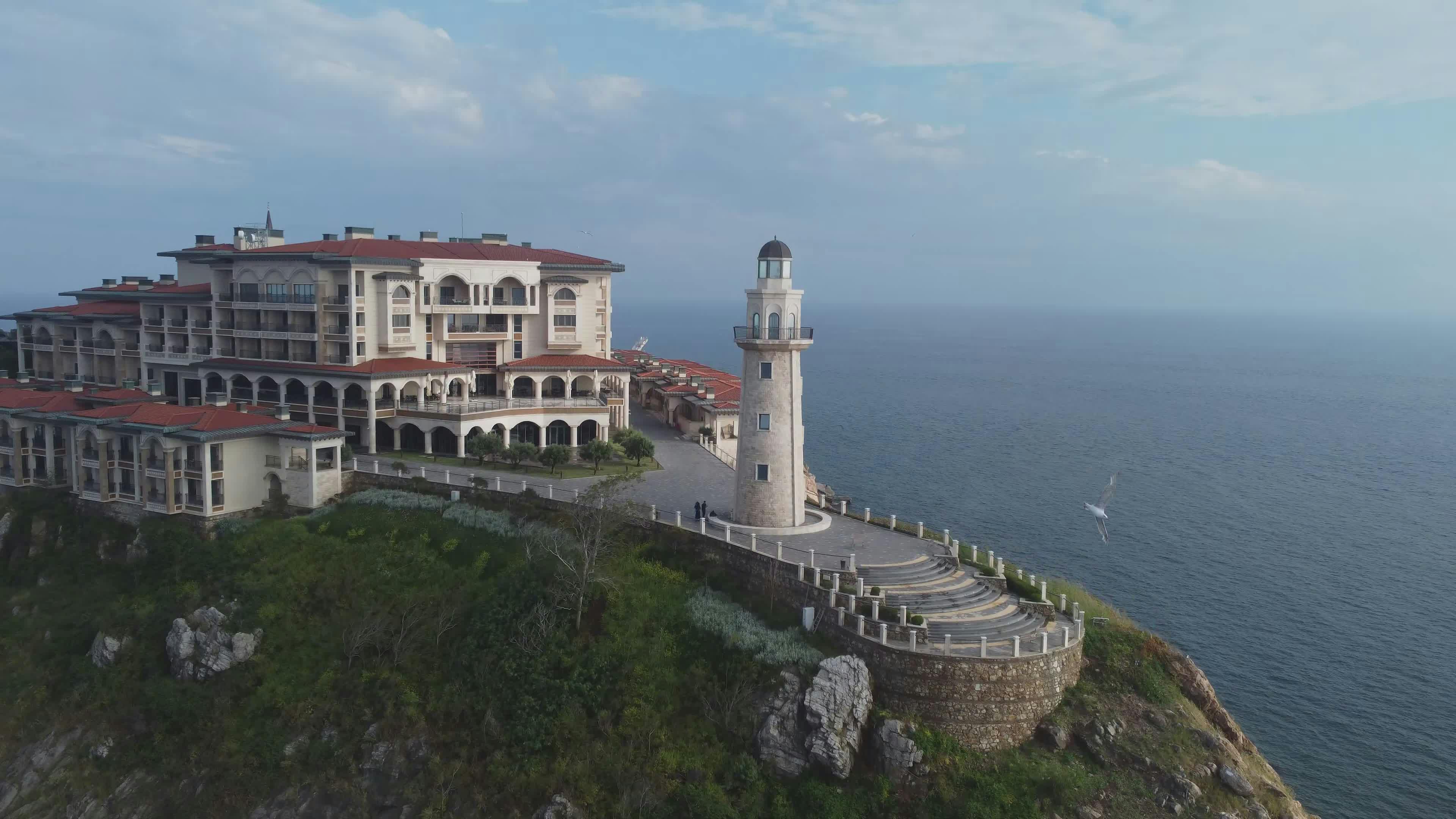Majestic Aerial View of Cliffside Lighthouse Free Stock Video Footage ...