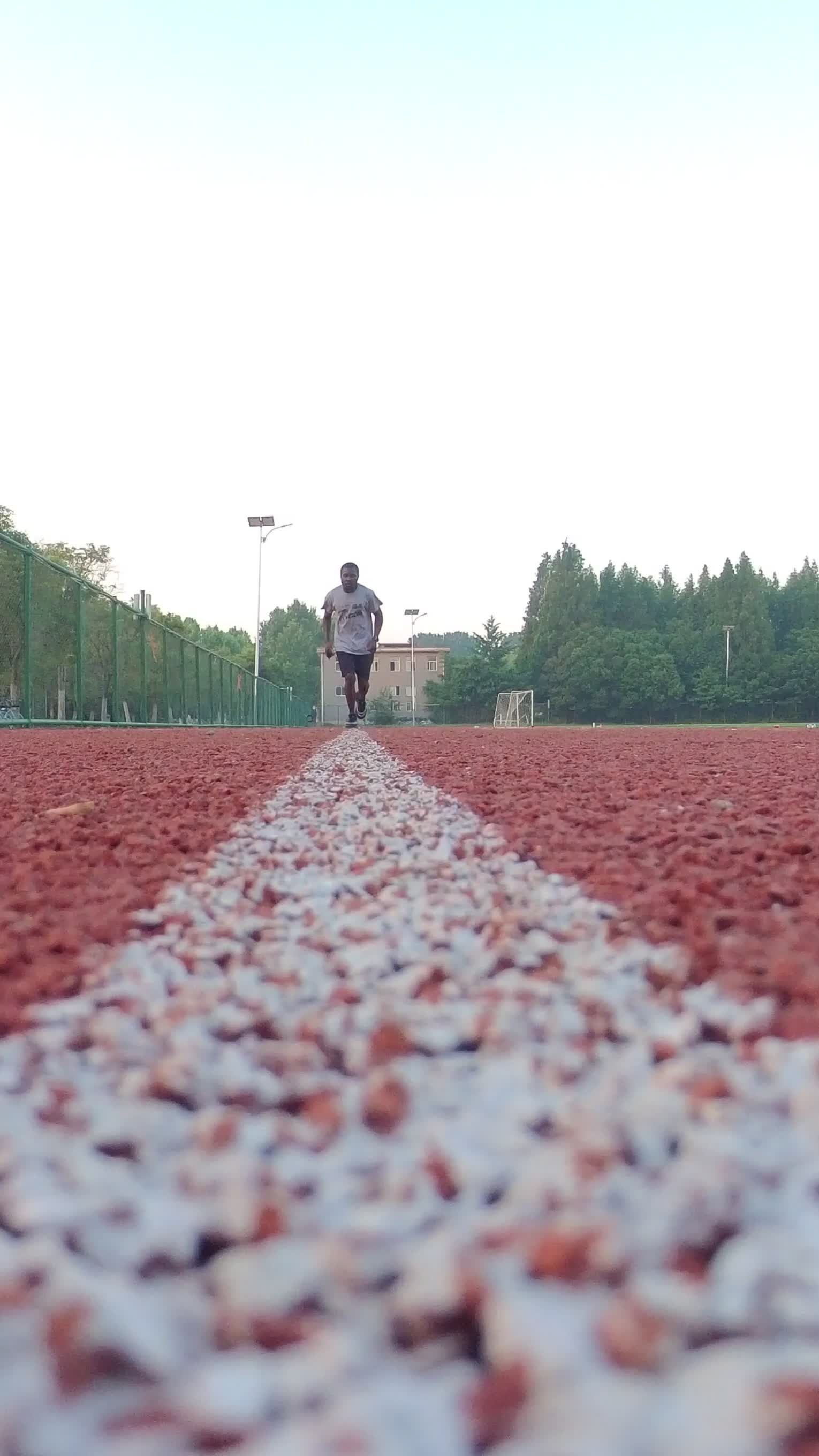 Runner on Outdoor Track During Daytime Free Stock Video Footage ...