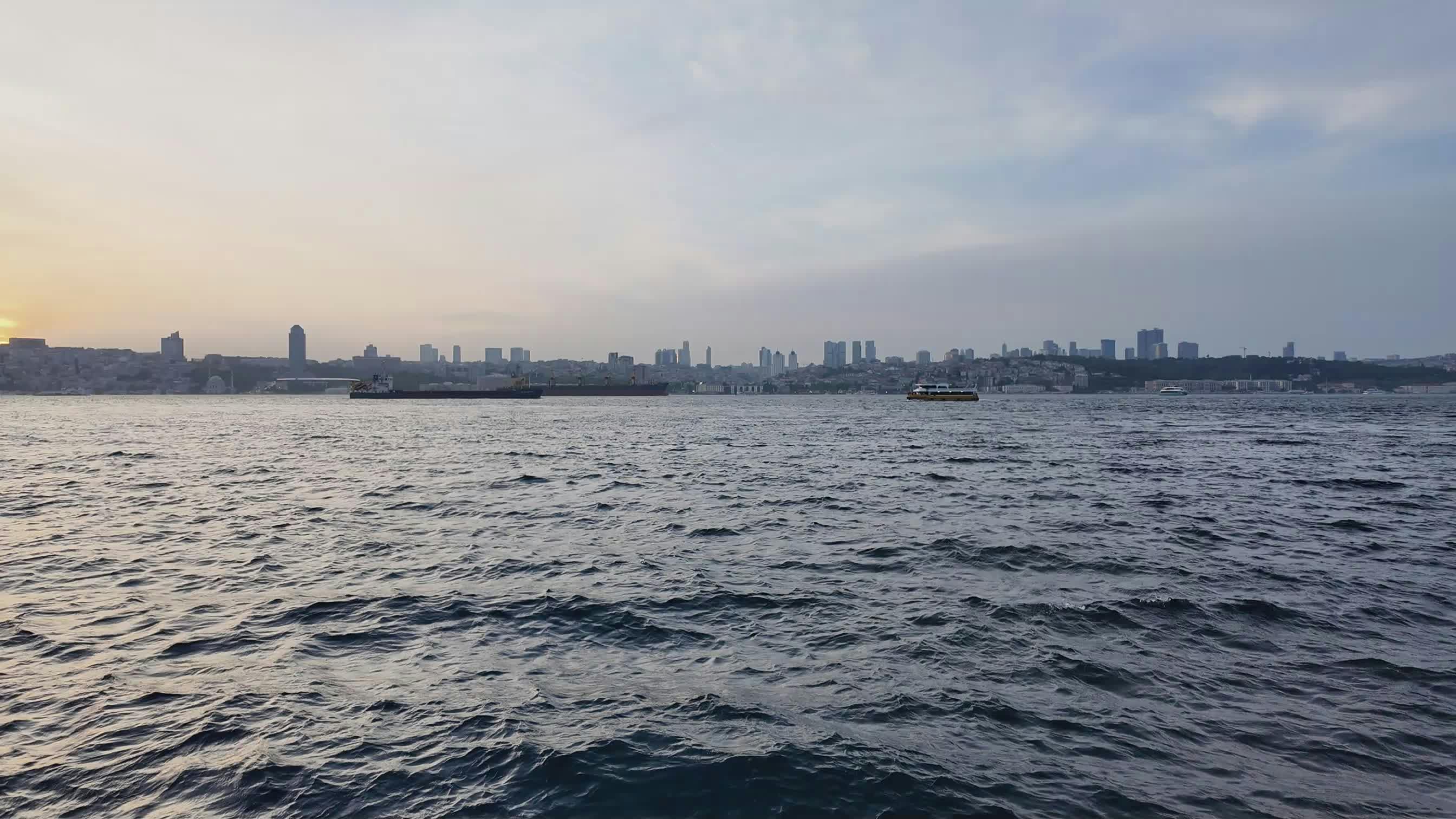 Serene City Skyline Across River at Sunset Free Stock Video Footage ...