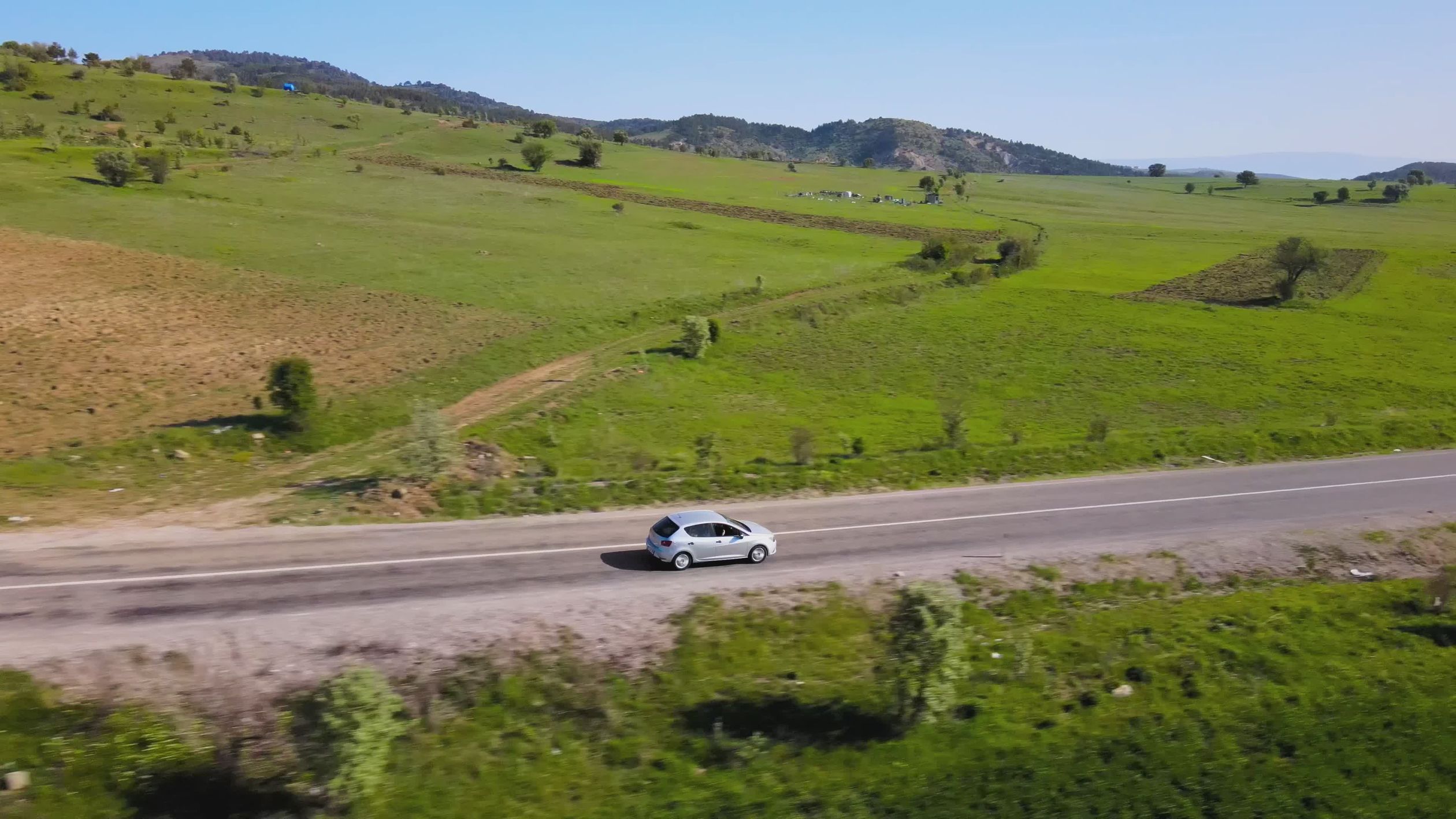 Aerial View of Car on Scenic Countryside Road Free Stock Video Footage ...