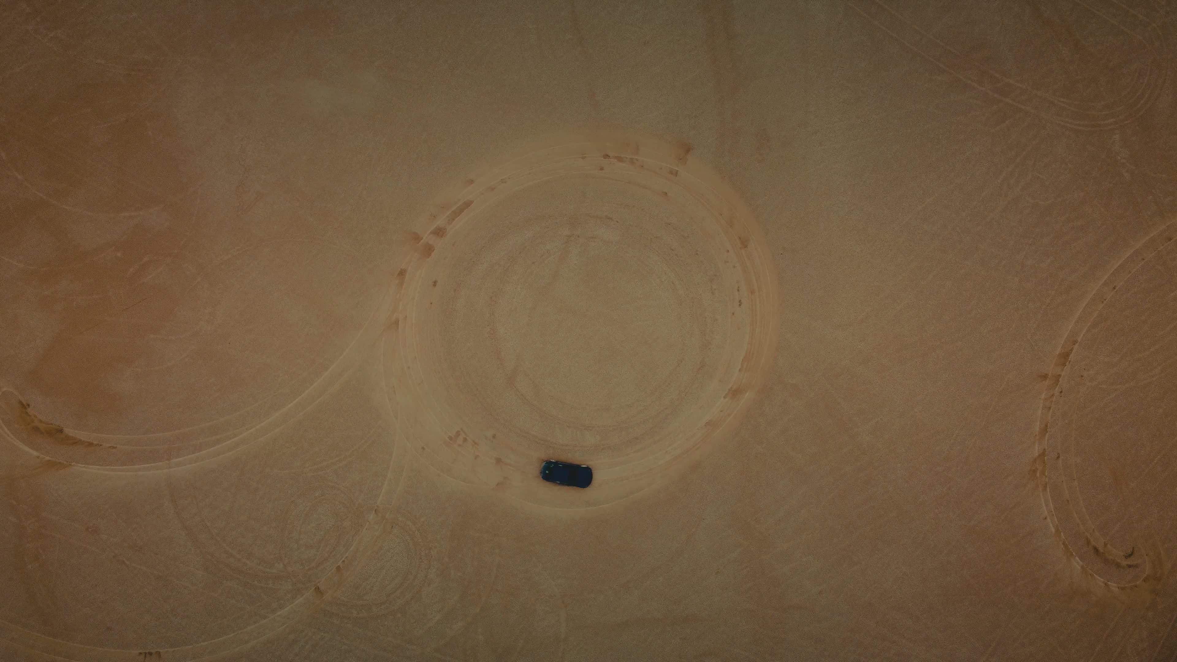 Aerial View of Car Drifting in Desert Landscape Free Stock Video ...