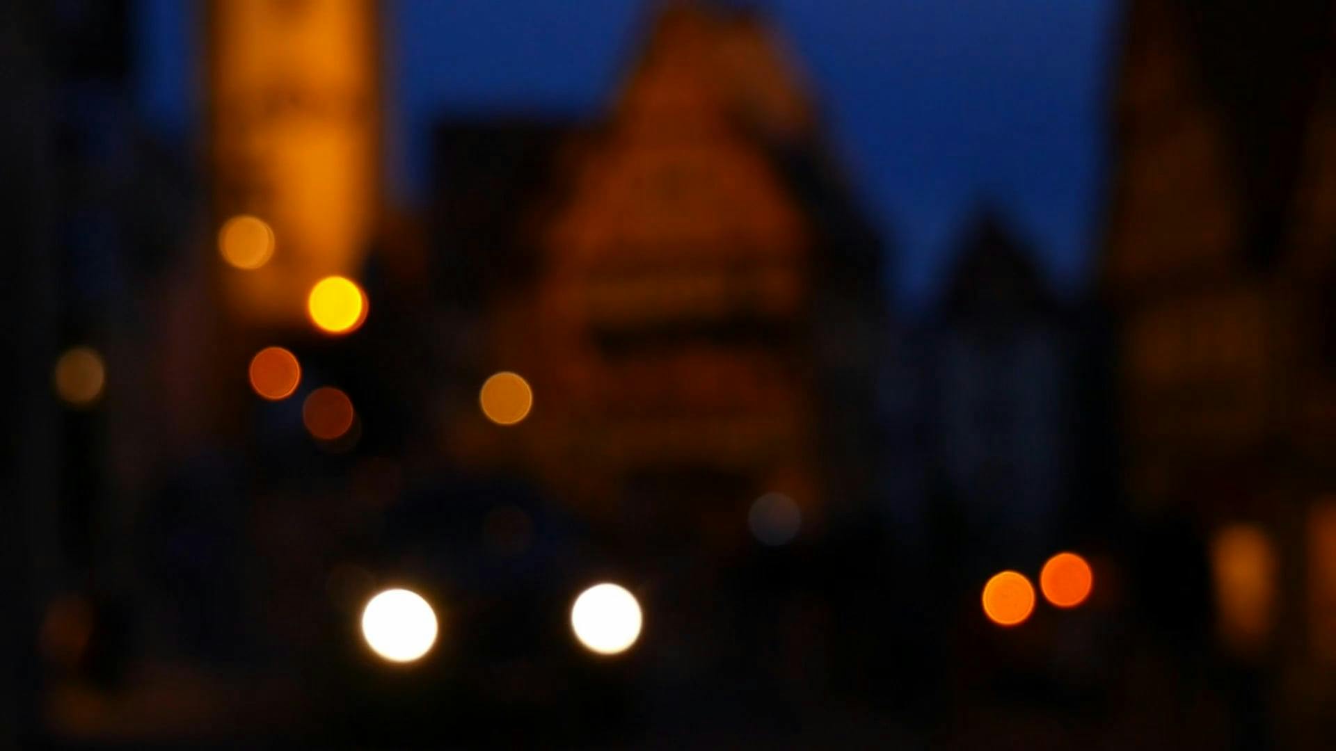 Lights Bouncing Off An Out Of Focus Camera · Free Stock Video