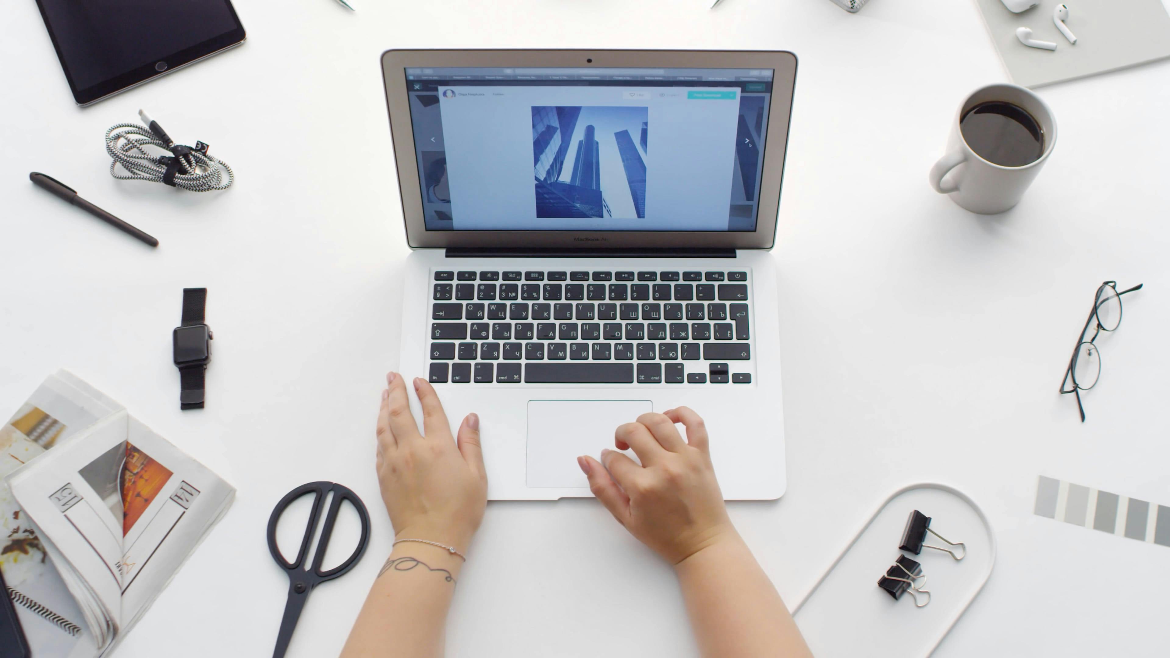 A Person Scrolling On Picture Images In A Laptop · Free Stock Video