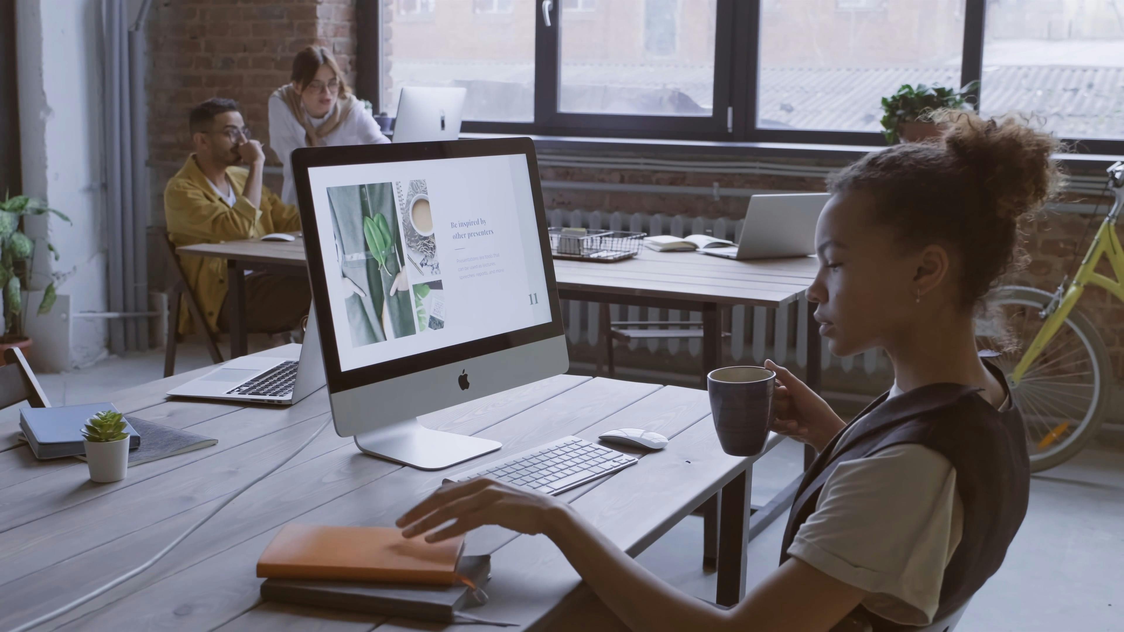 A Woman Working On A Computer Base On Her Notes · Free Stock Video