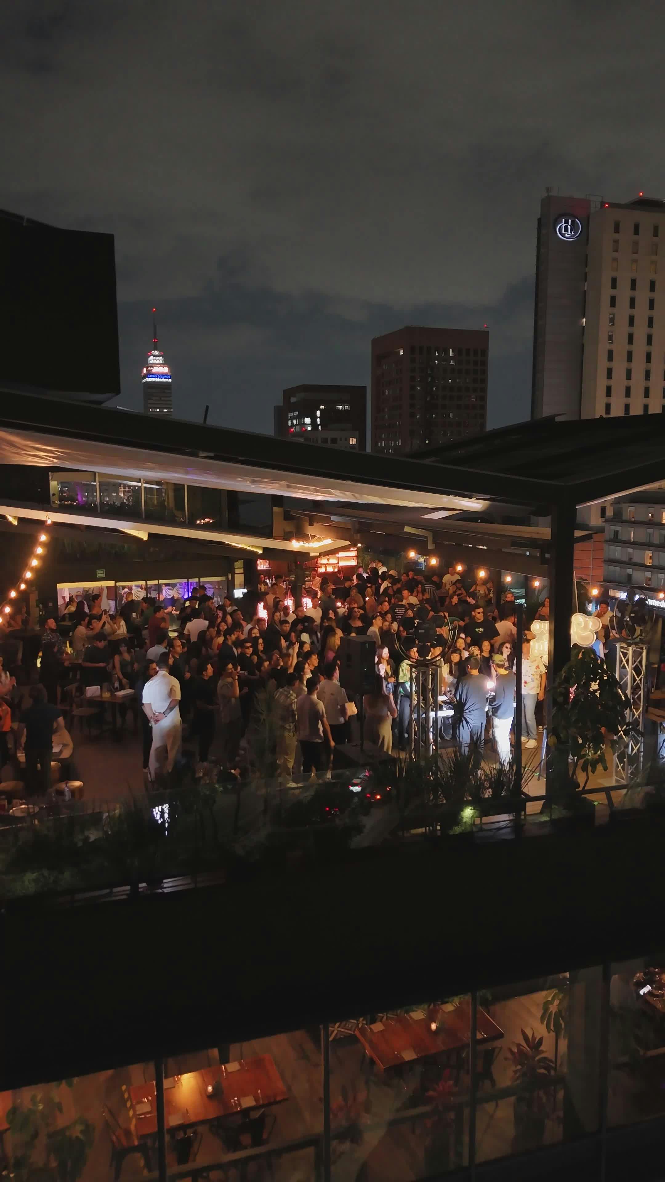 Vibrant Nightlife at Rooftop Bar Celebration Free Stock Video Footage ...