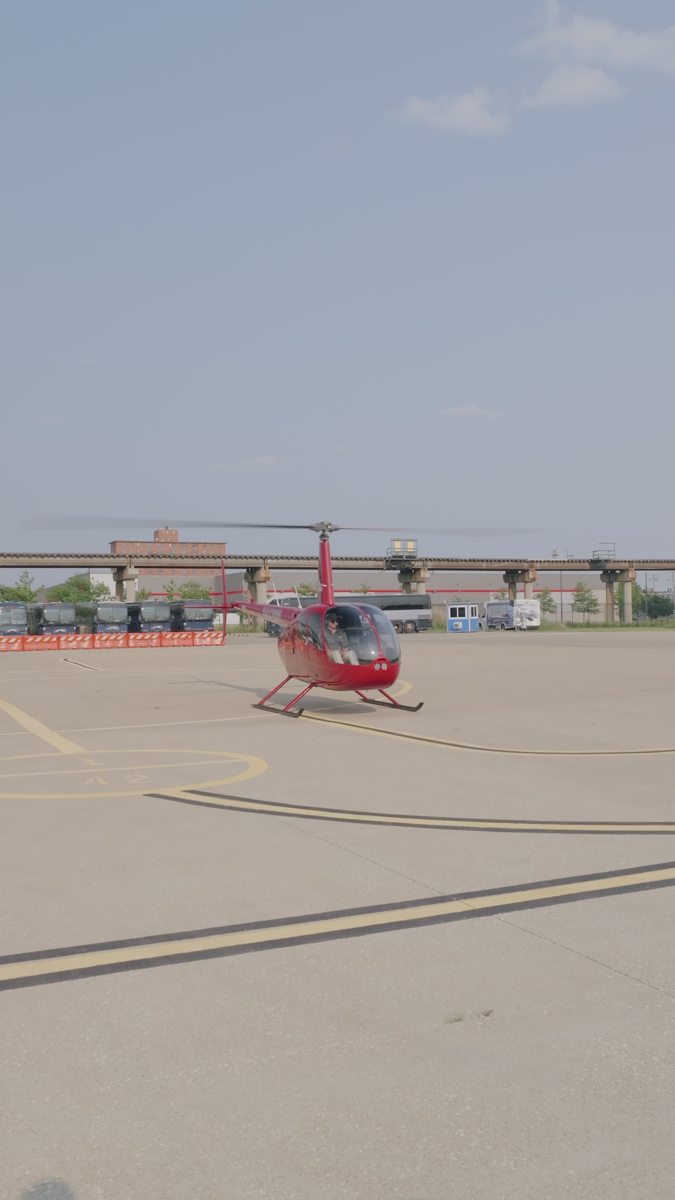 Red Helicopter Takes Off from Urban Helipad Free Stock Video Footage ...