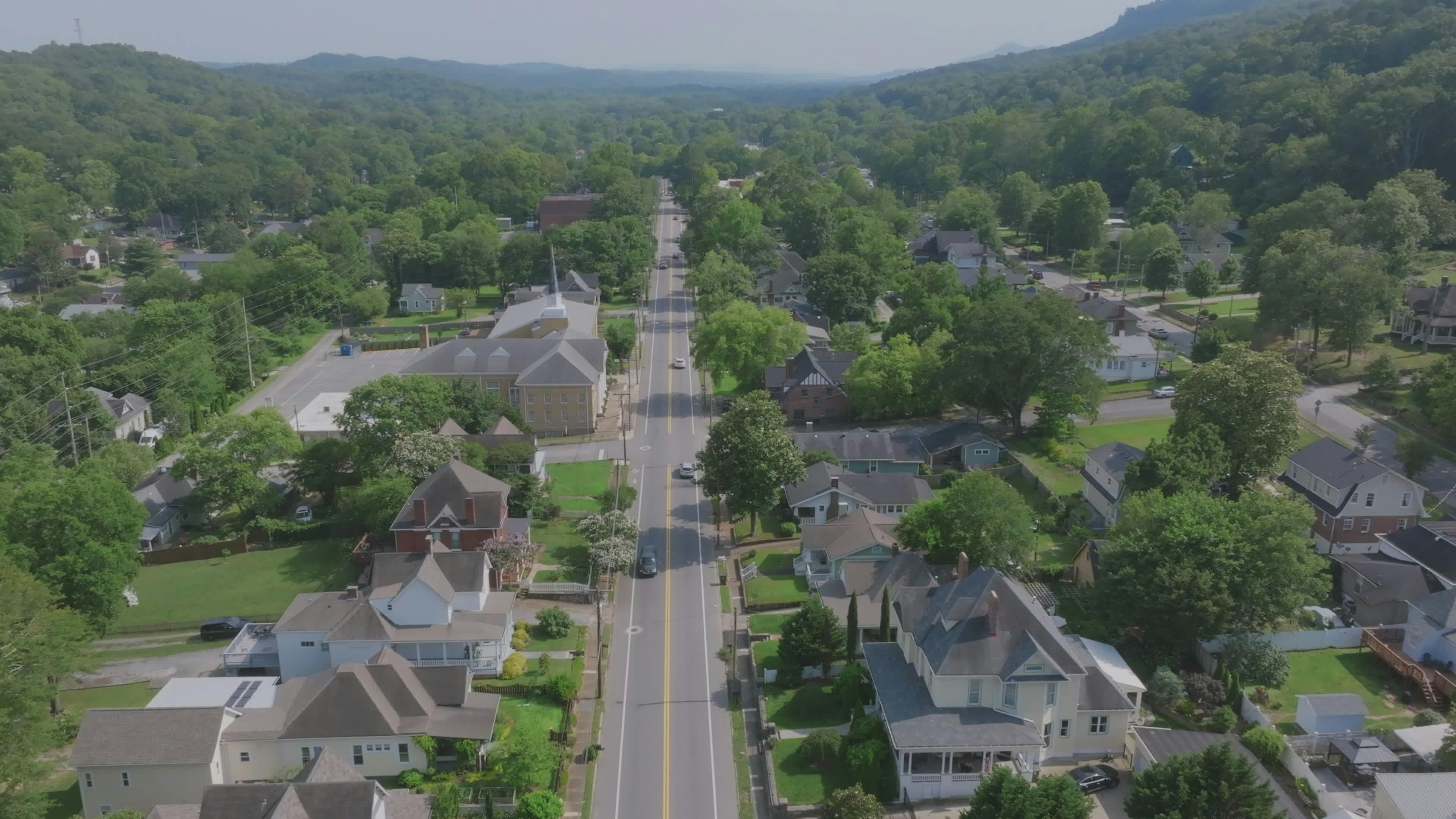 Charming Small Town Aerial View with Lush Greenery Free Stock Video ...