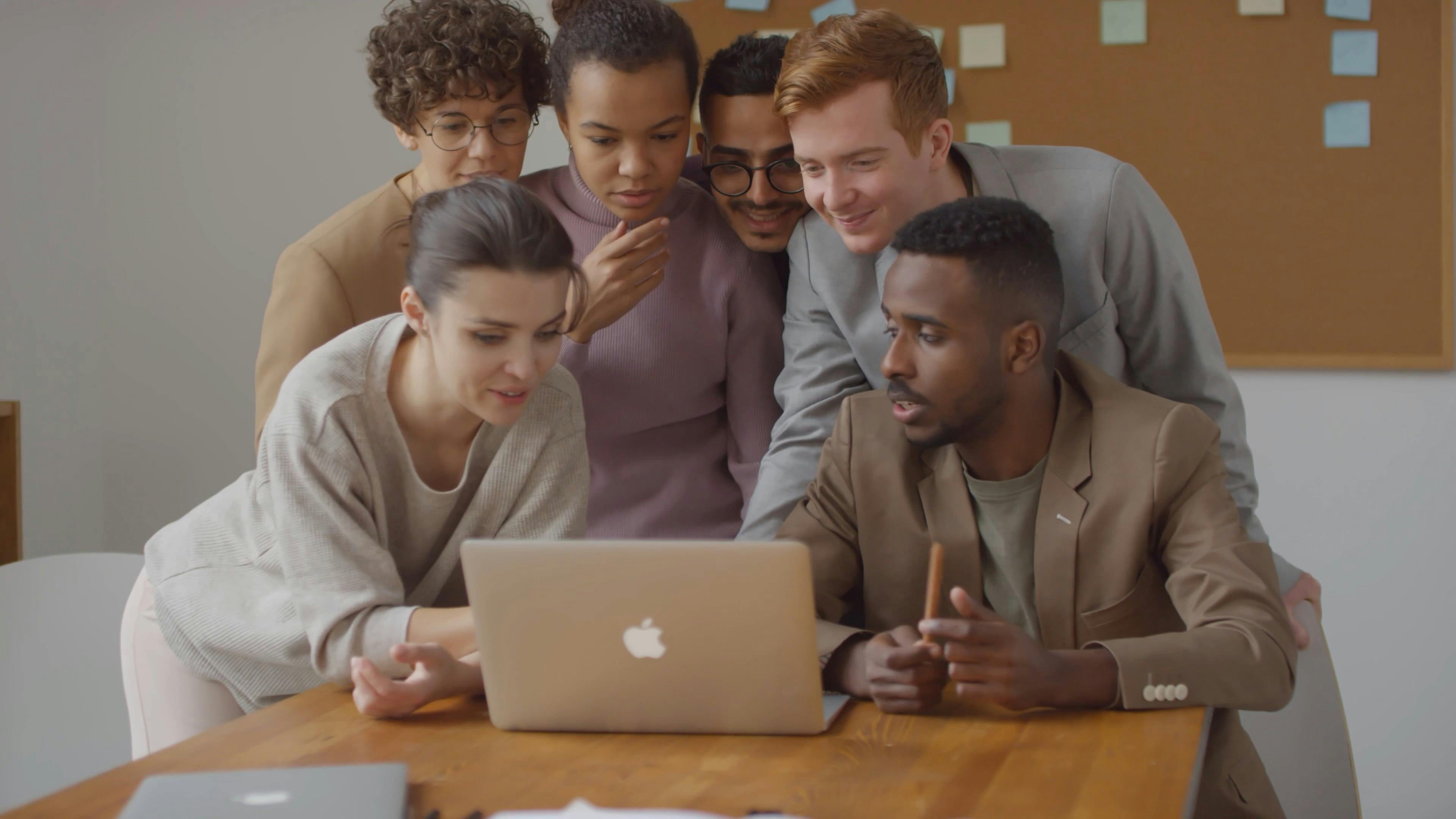 A Group Of People Comparing Notes On The Board Free Stock Video Footage ...