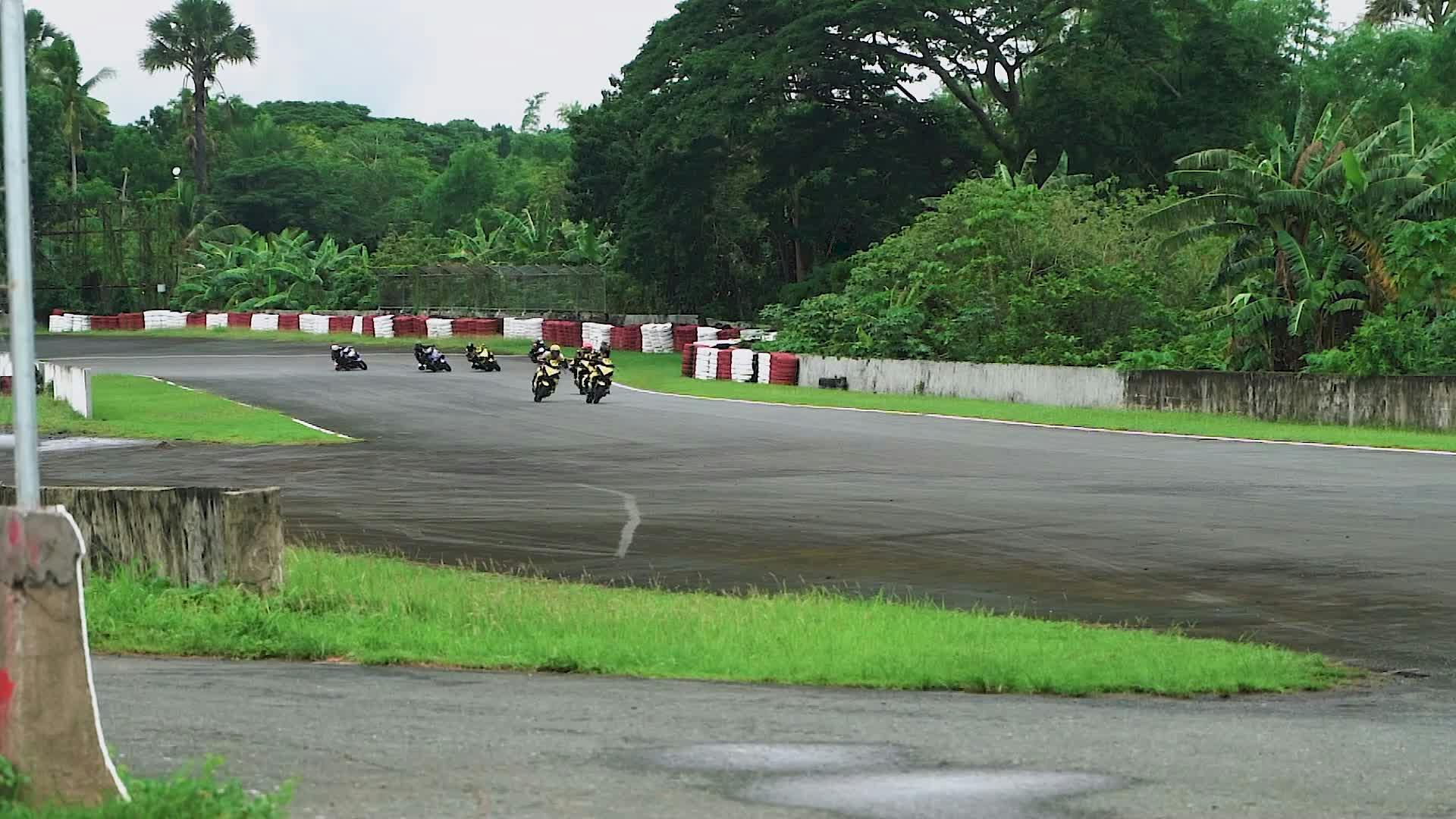 Exciting Motorcycle Race on Lush Green Track Free Stock Video Footage ...