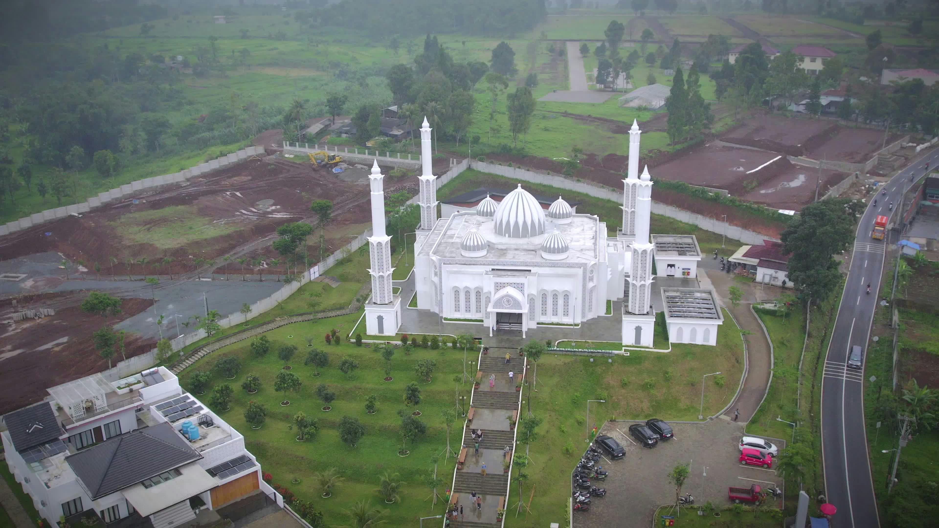 Stunning Aerial View of White Mosque in Lush Landscape Free Stock Video ...
