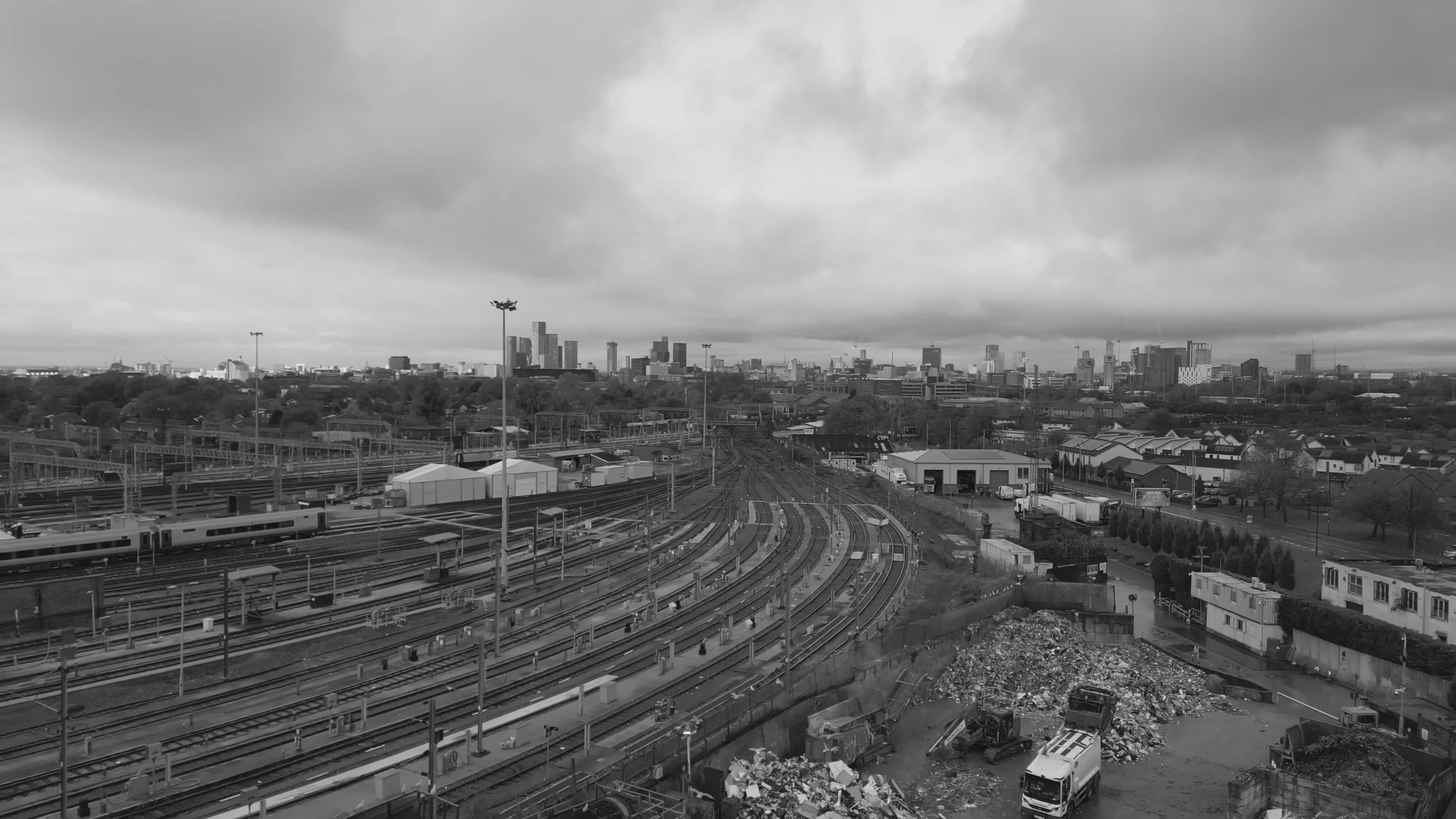 Urban Train Yard Aerial View with City Skyline Free Stock Video Footage ...