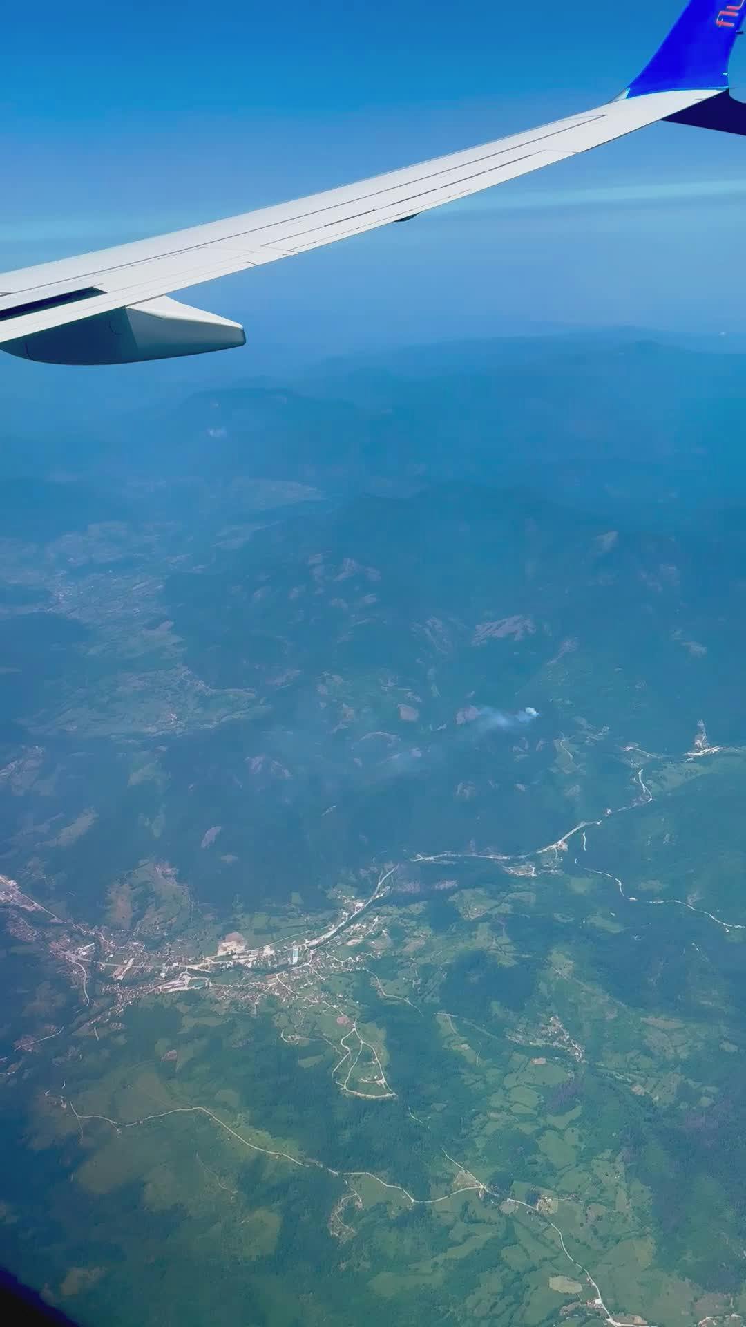 Scenic Aerial View from Airplane Over Lush Landscape Free Stock Video ...