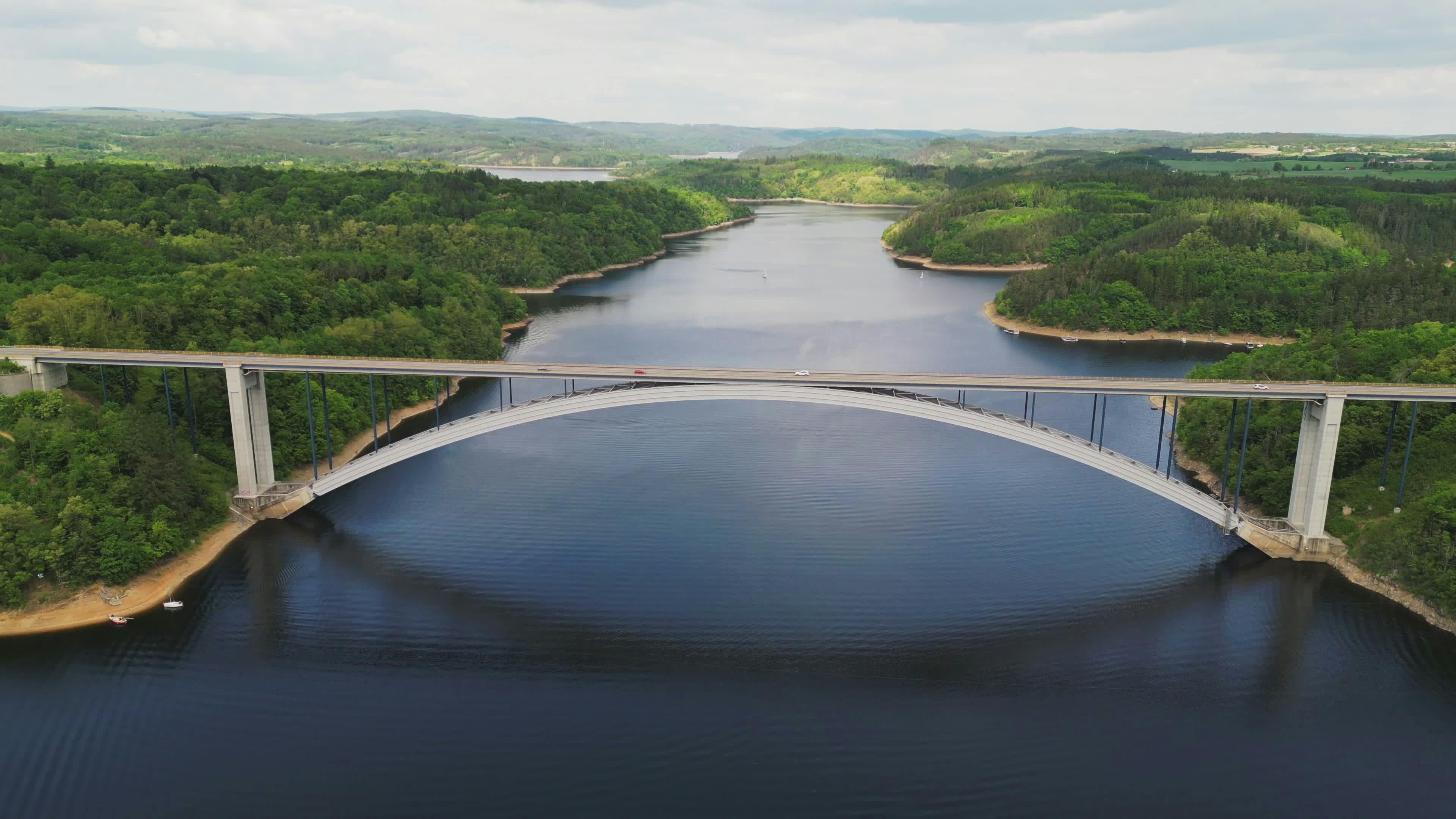 Aerial View of Serene River Bridge Landscape Free Stock Video Footage ...