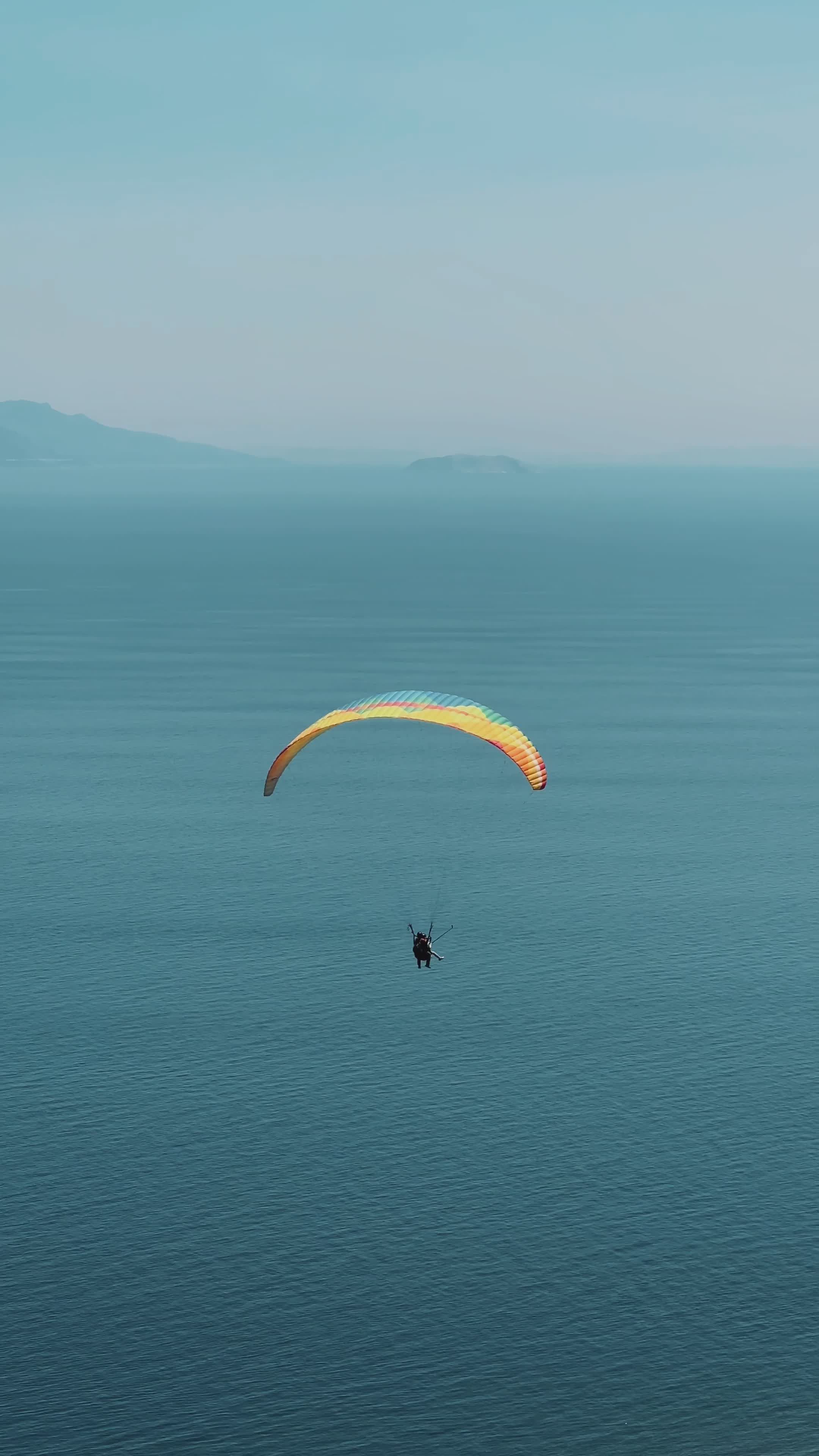 Stunning Paragliding Over Serene Ocean Free Stock Video Footage ...