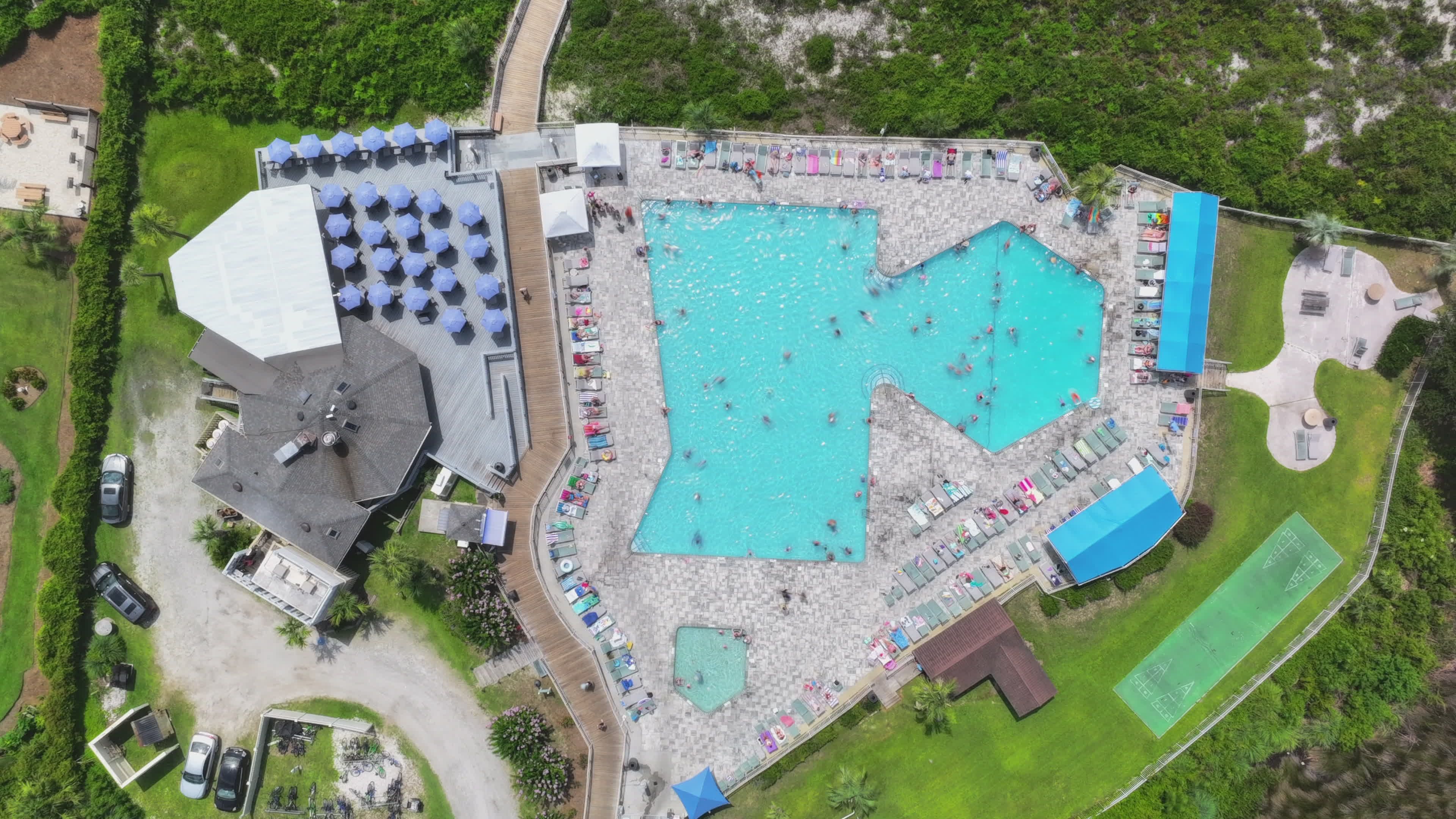 Aerial View of Vibrant Outdoor Swimming Pool Scene Free Stock Video ...