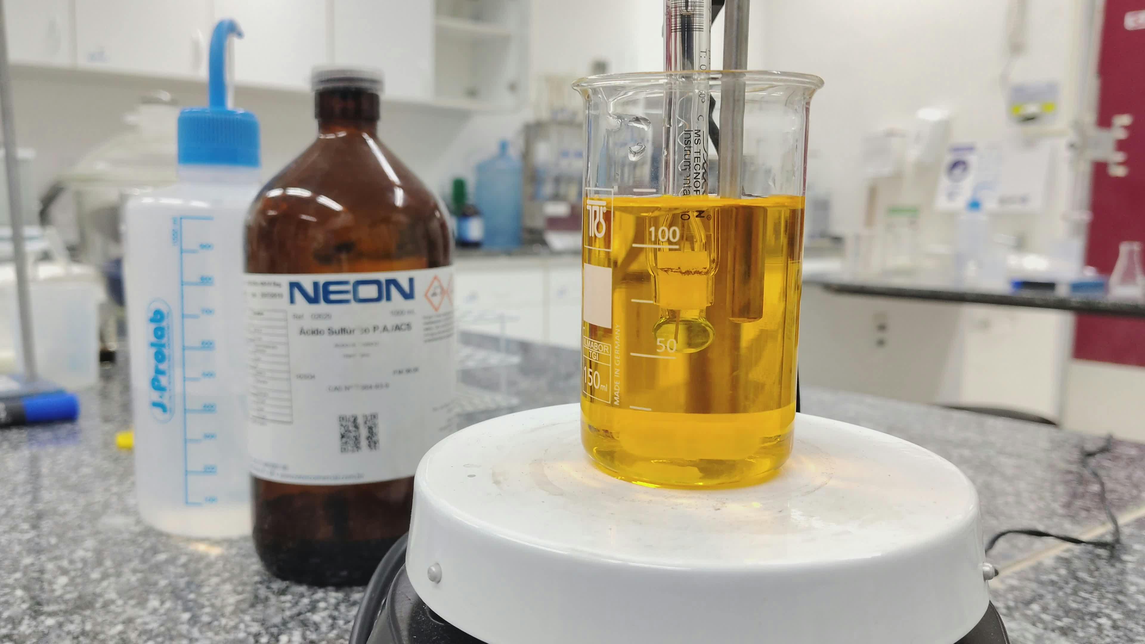 Laboratory Beaker Mixing Bright Yellow Solution Free Stock Video ...