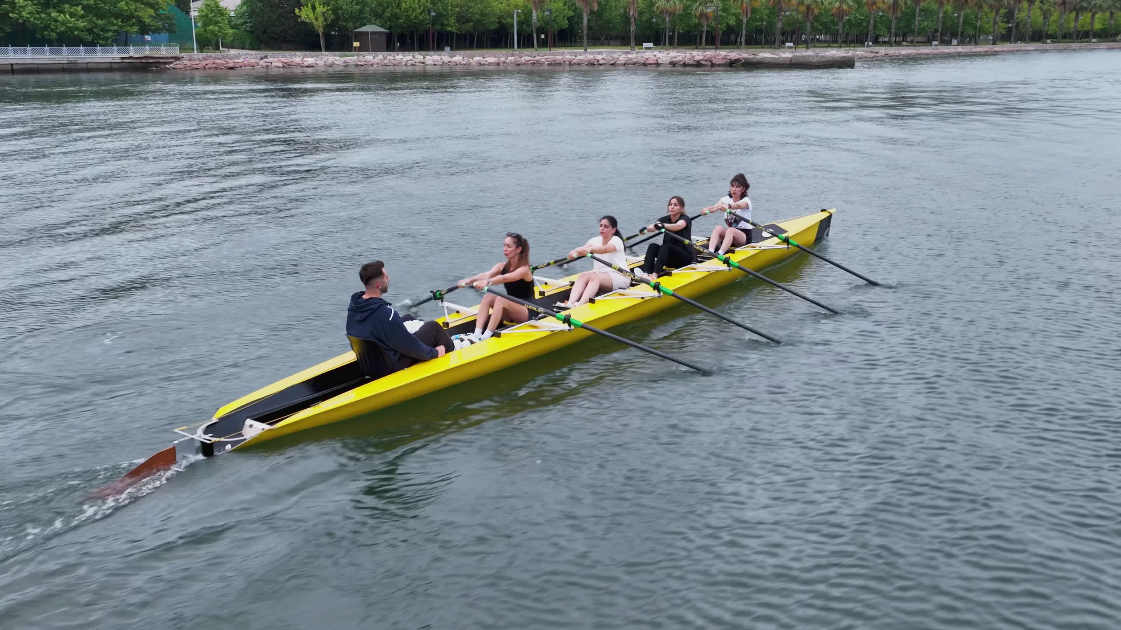 4K Aerial Shot of Team Rowing in Sync on River Free Stock Video Footage ...