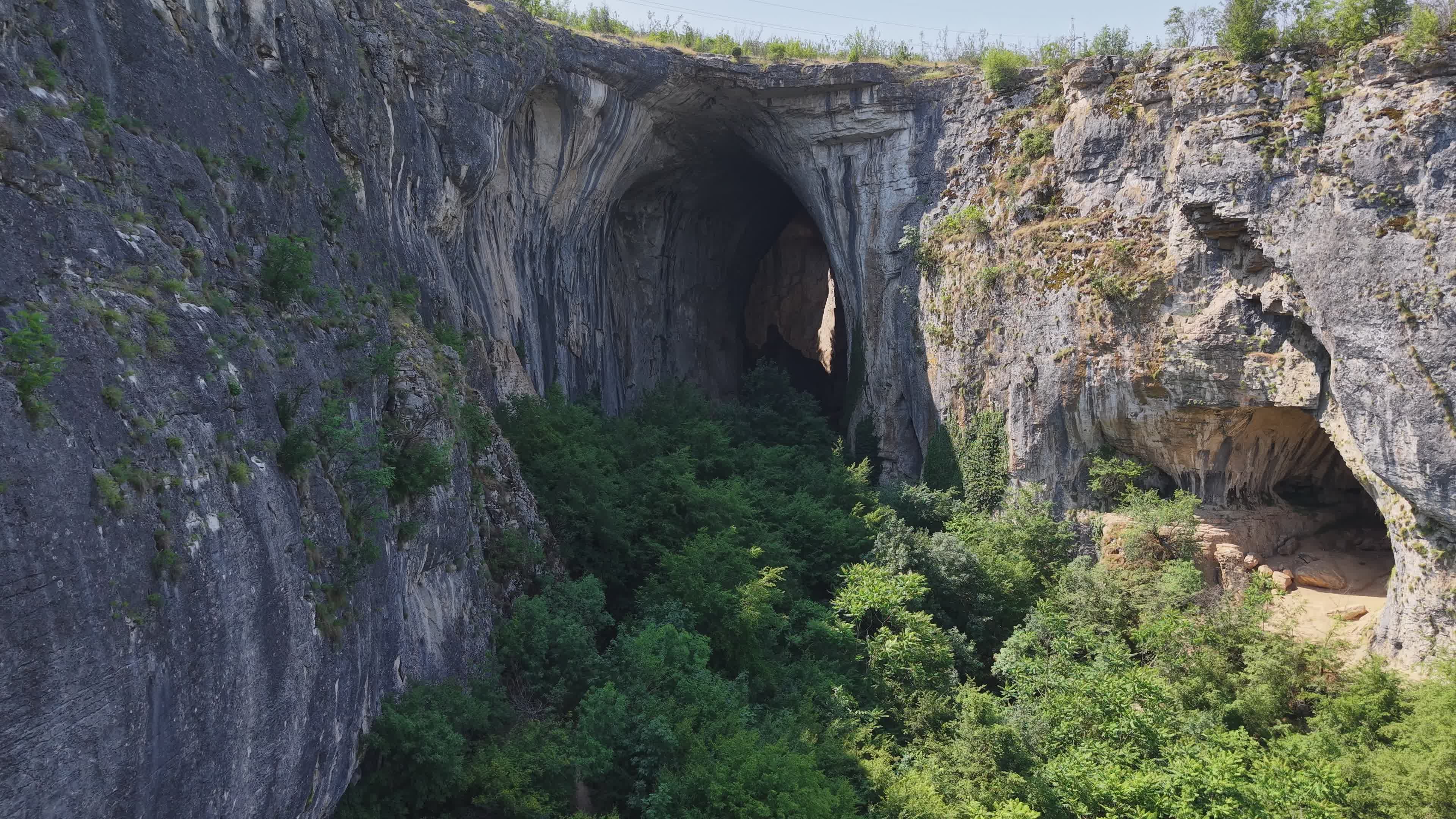 Explore the Majestic Prohodna Cave in Bulgaria Free Stock Video Footage ...