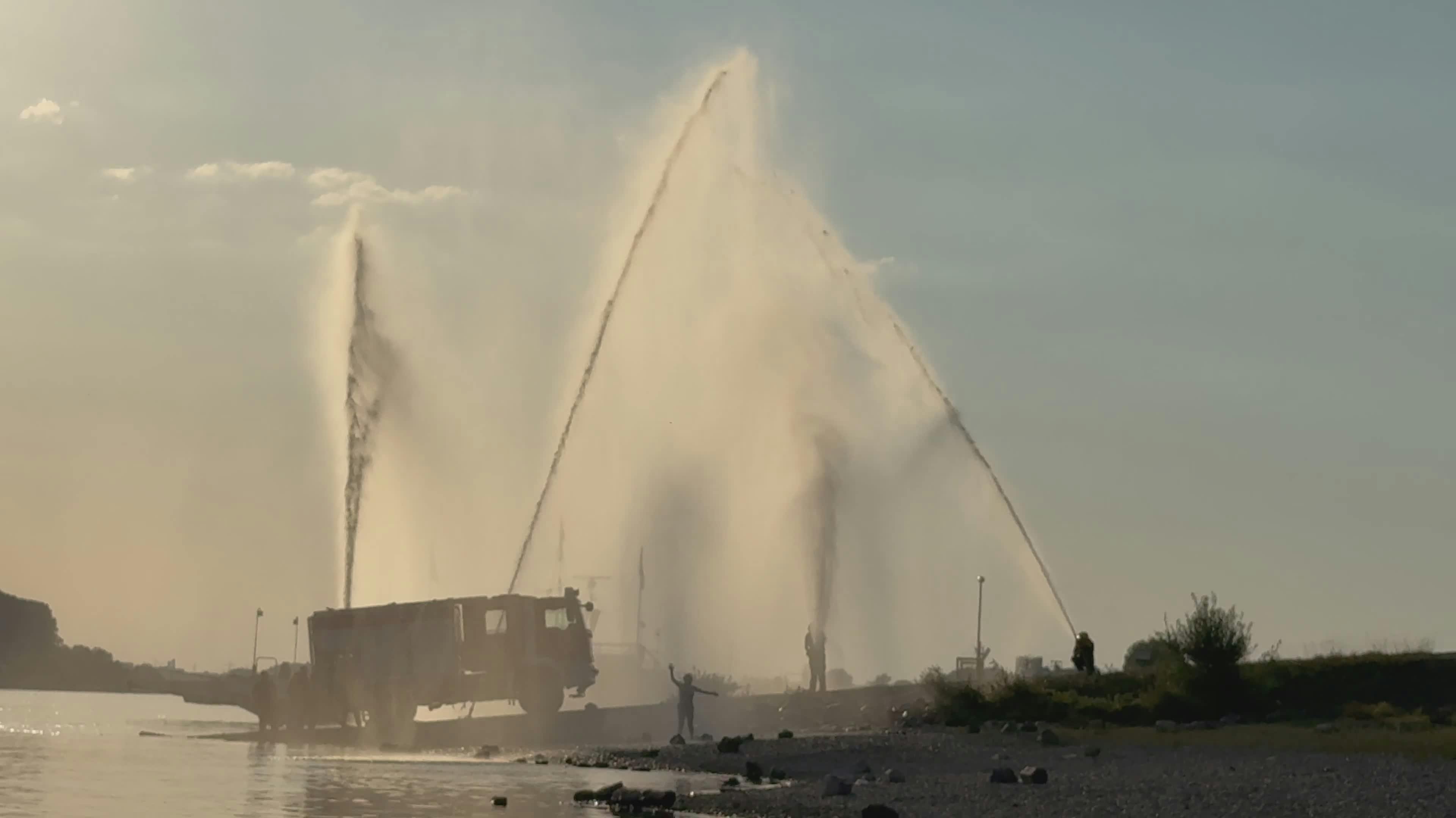 Fire Engine Water Spray Display at Sunset Free Stock Video Footage ...