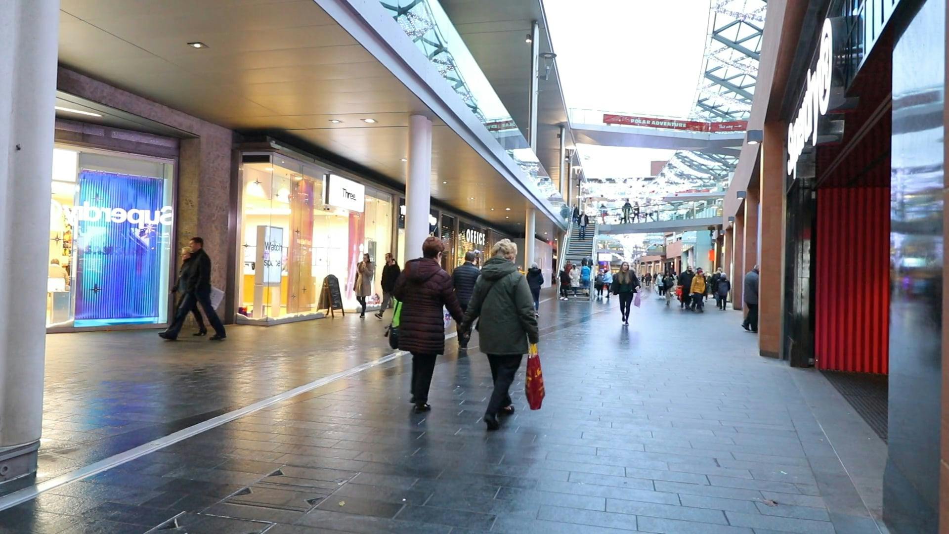 People Walking In A Street Outside The Shopping Malls · Free Stock Video