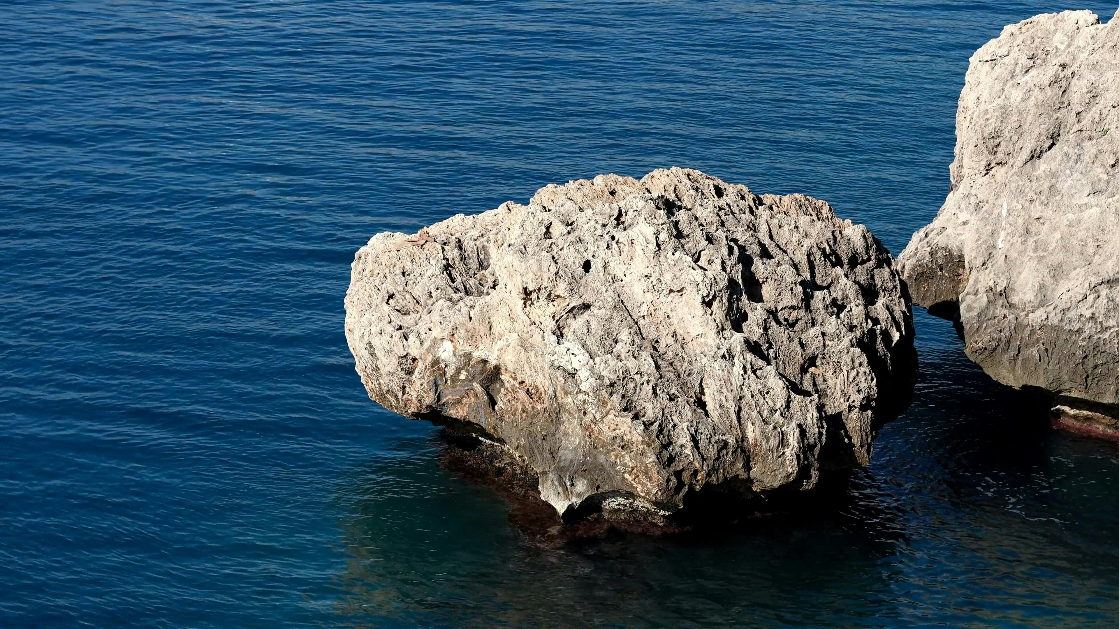 Natural Rock Formations Above The Sea Surface · Free Stock Video
