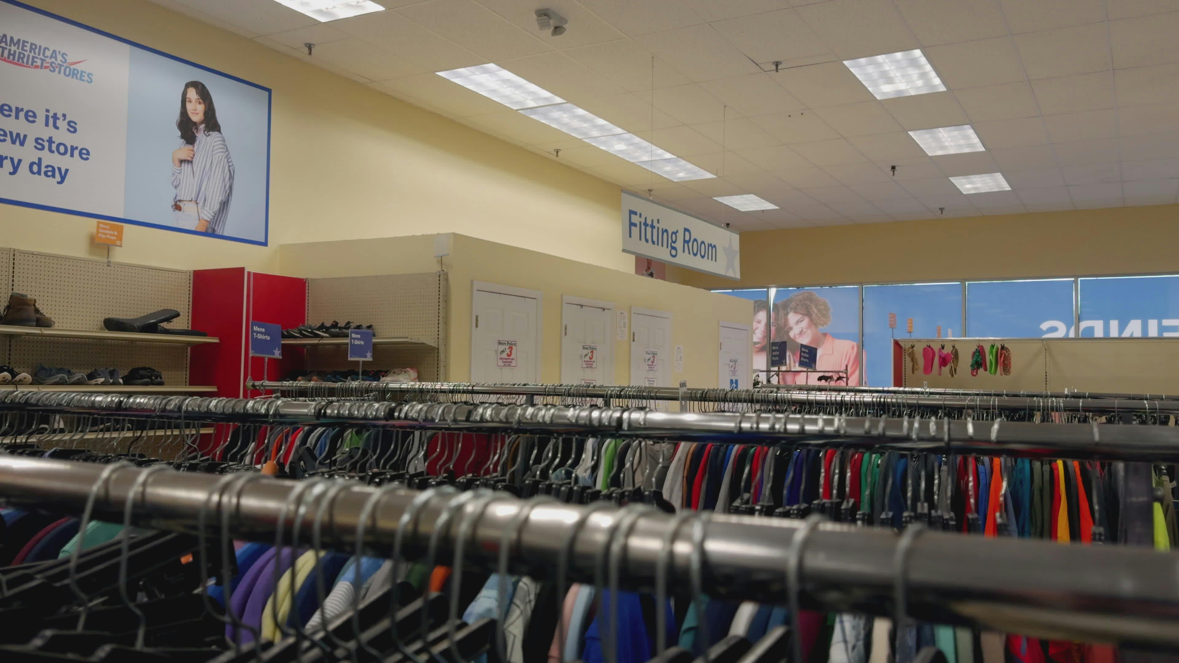 Colorful Clothes Racks in Thrift Store Interior Free Stock Video ...