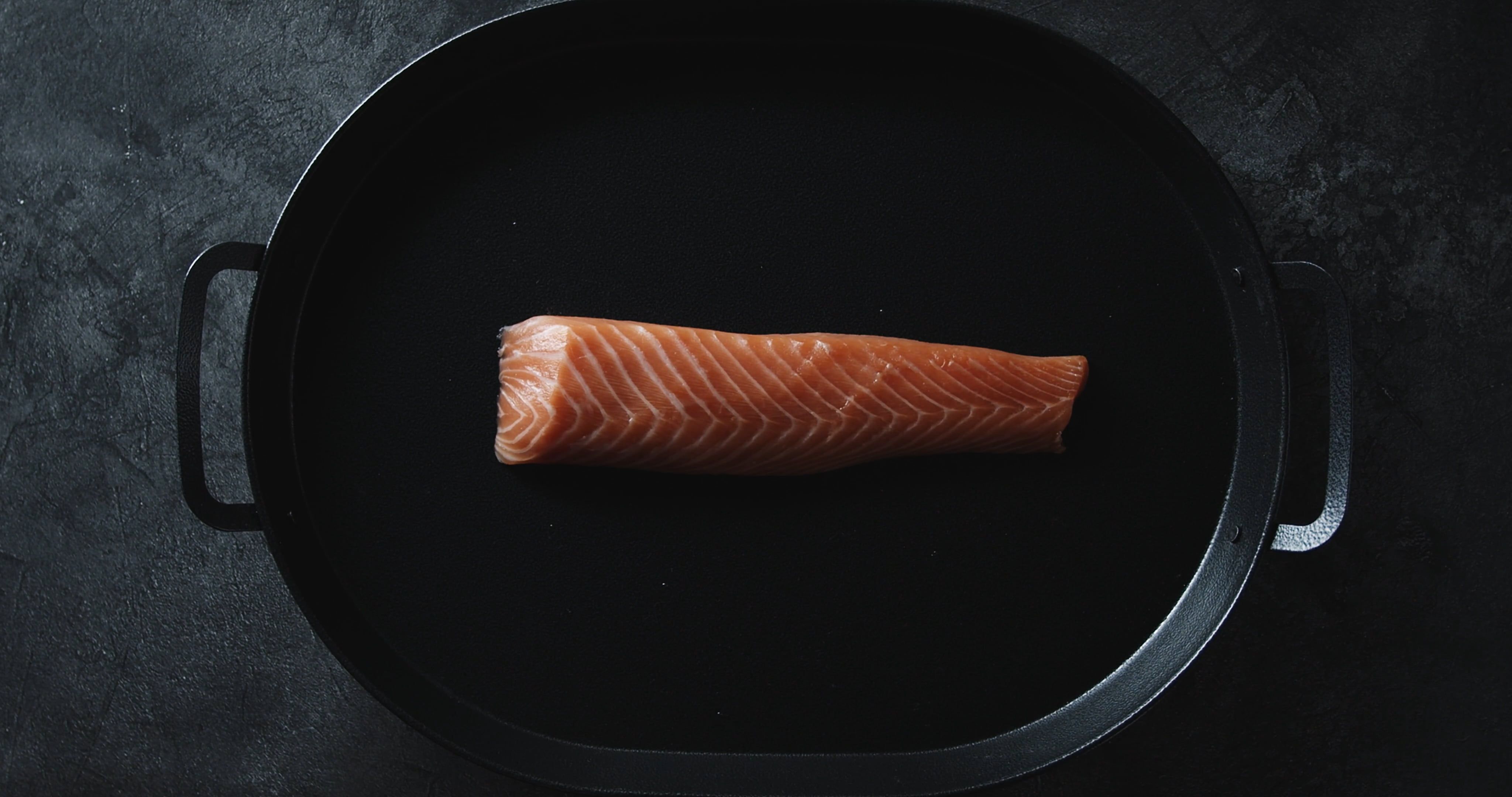 Torching A Slab Of Salmon Meat Over A Sizzling Tray Free Stock Video ...