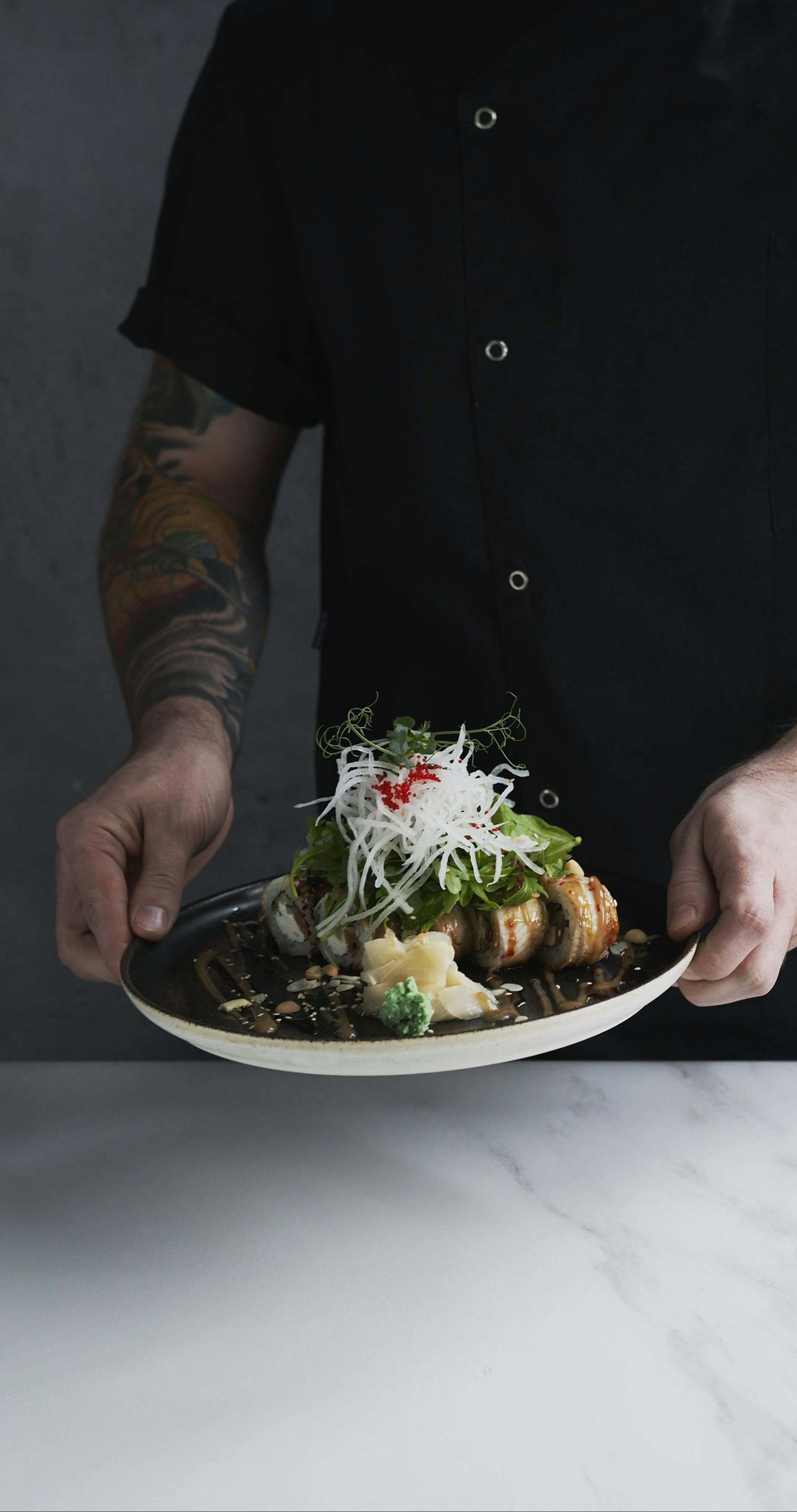 Food Art Plating Of A Sushi Rice Roll With Vegetables Toppings Free ...