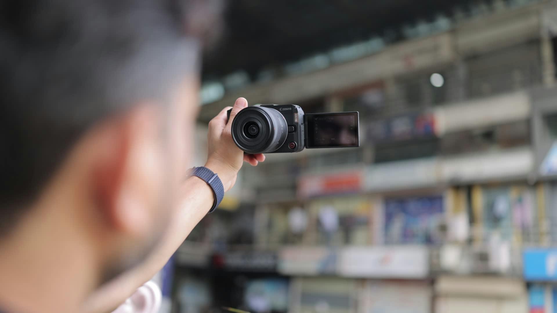 Vlogger Holding Camera for Outdoor Recording Free Stock Video Footage ...