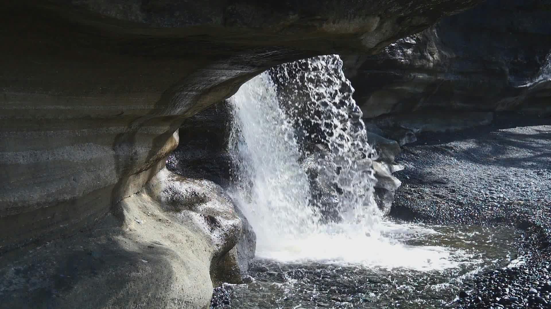 Captivating Waterfall at Sandcut Beach Cave Free Stock Video Footage ...