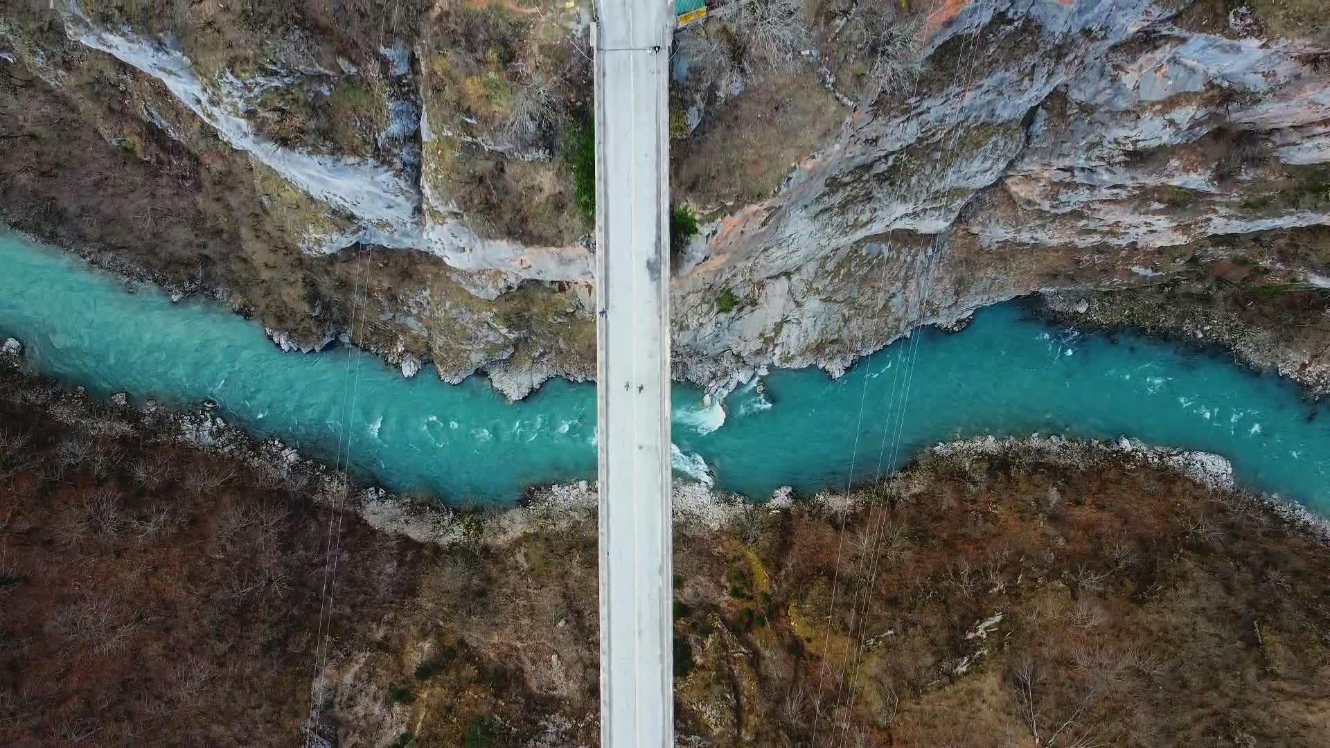 Aerial View of Arch Bridge Over Blue River Canyon Free Stock Video ...