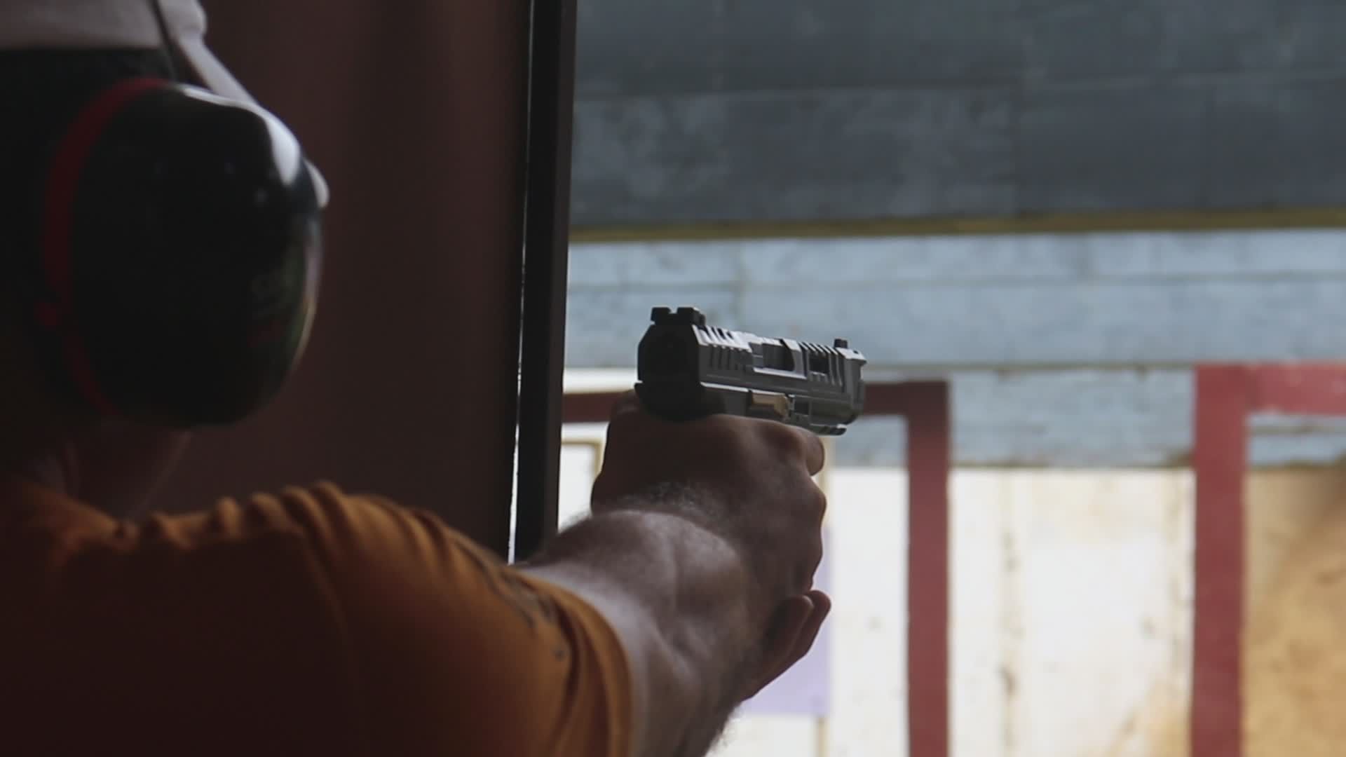 Man Practicing Shooting at Indoor Gun Range Free Stock Video Footage ...