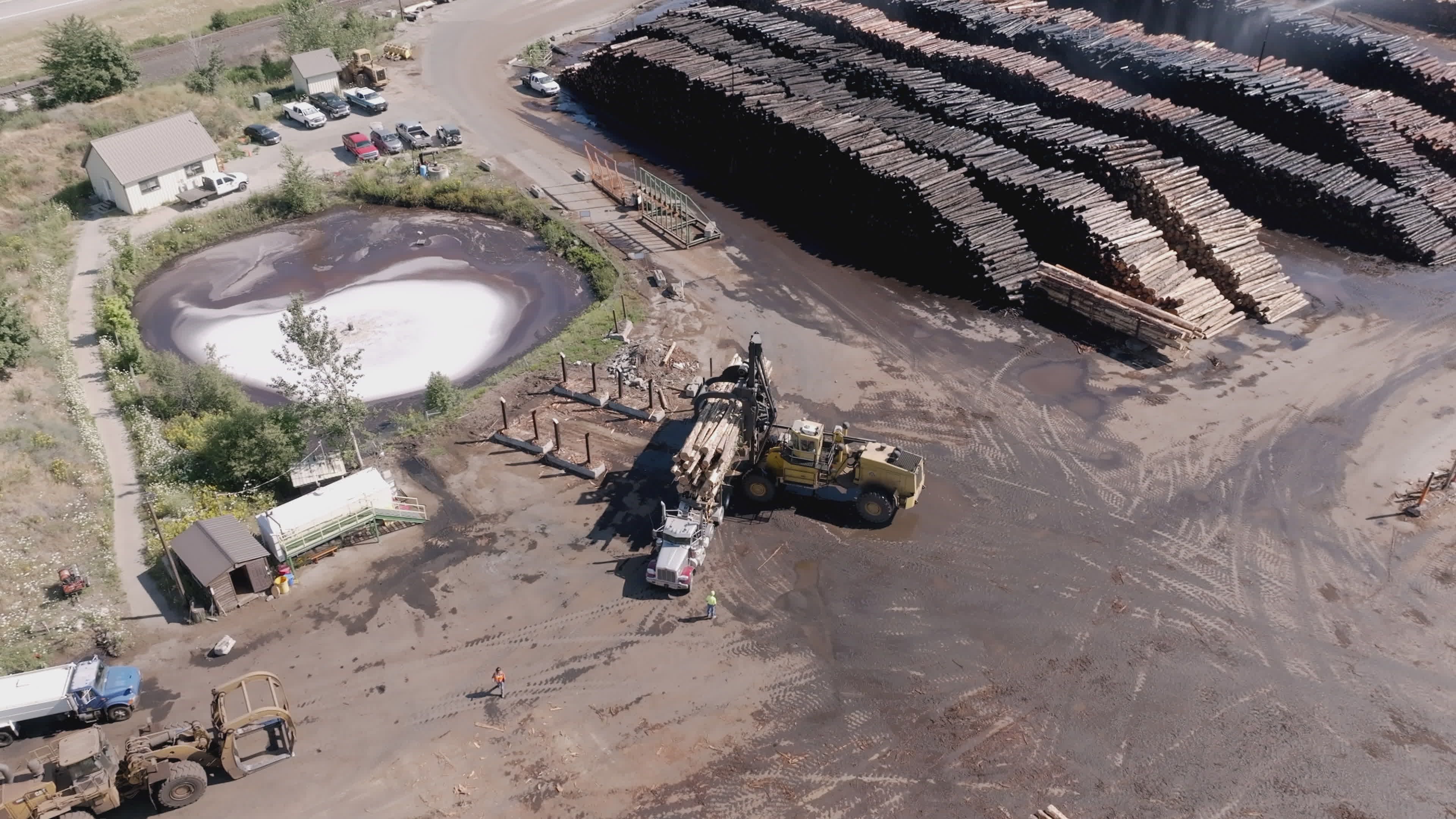 Aerial View of Industrial Timber Logging Yard Free Stock Video Footage ...