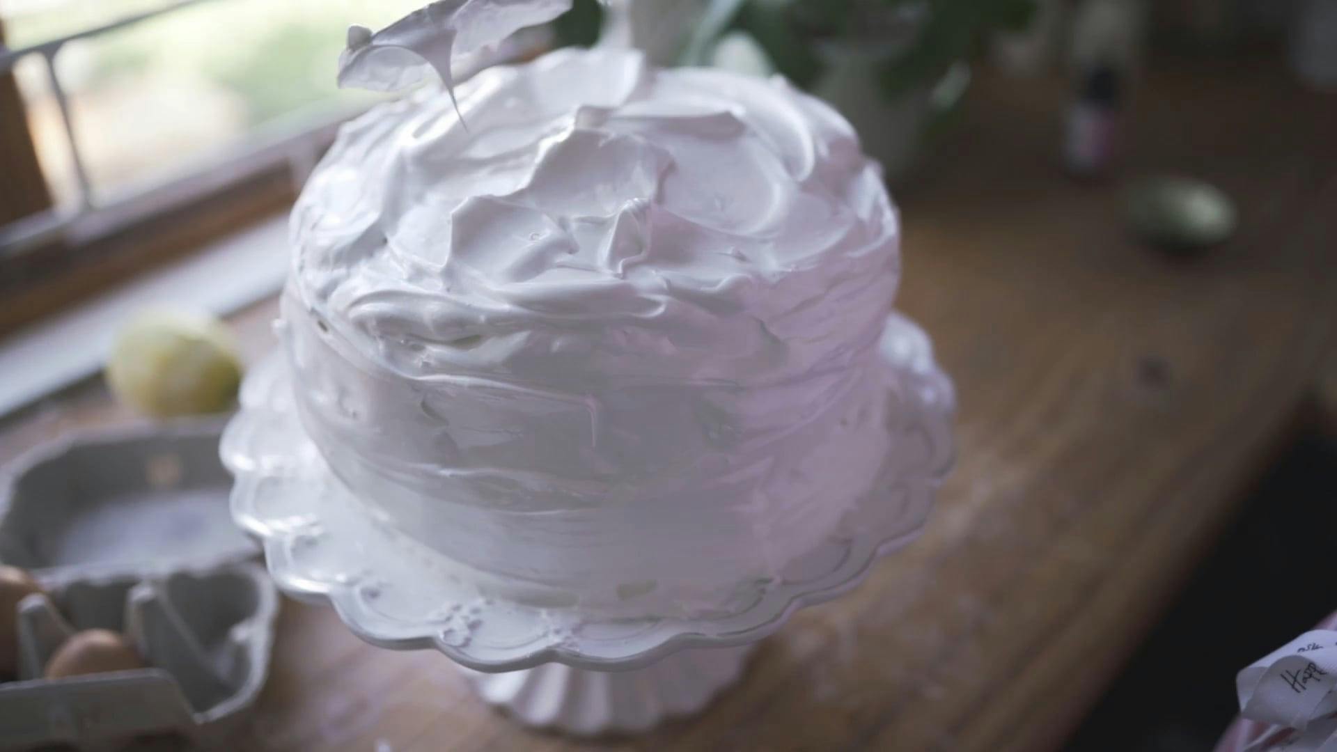 A Baker Applying Icing On A Cake · Free Stock Video
