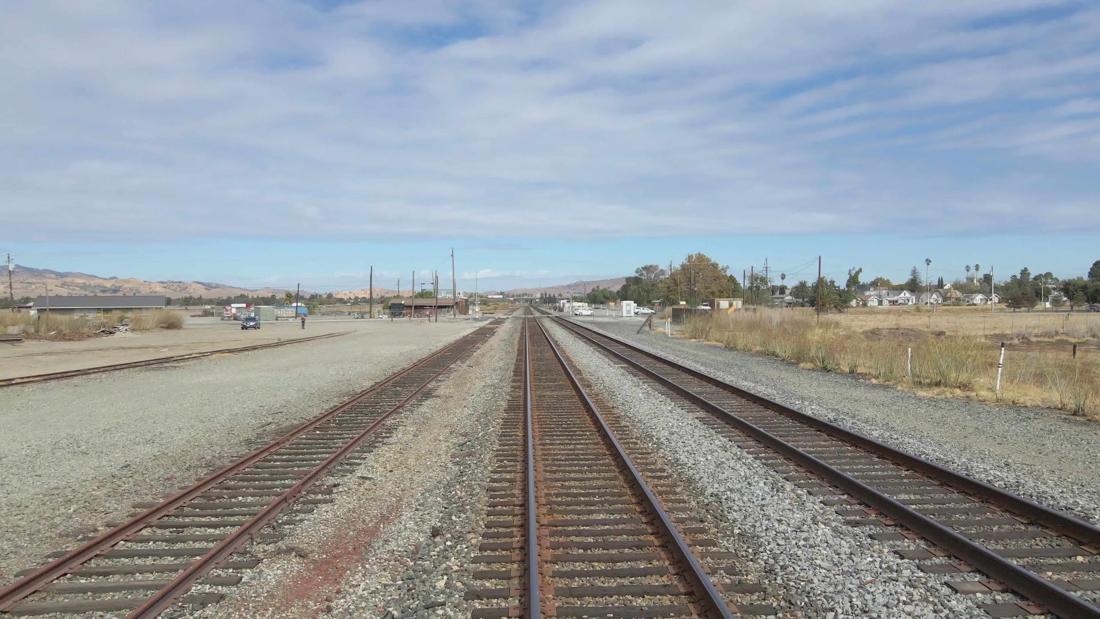 Open Country Railroad Tracks Under Blue Sky Free Stock Video Footage ...