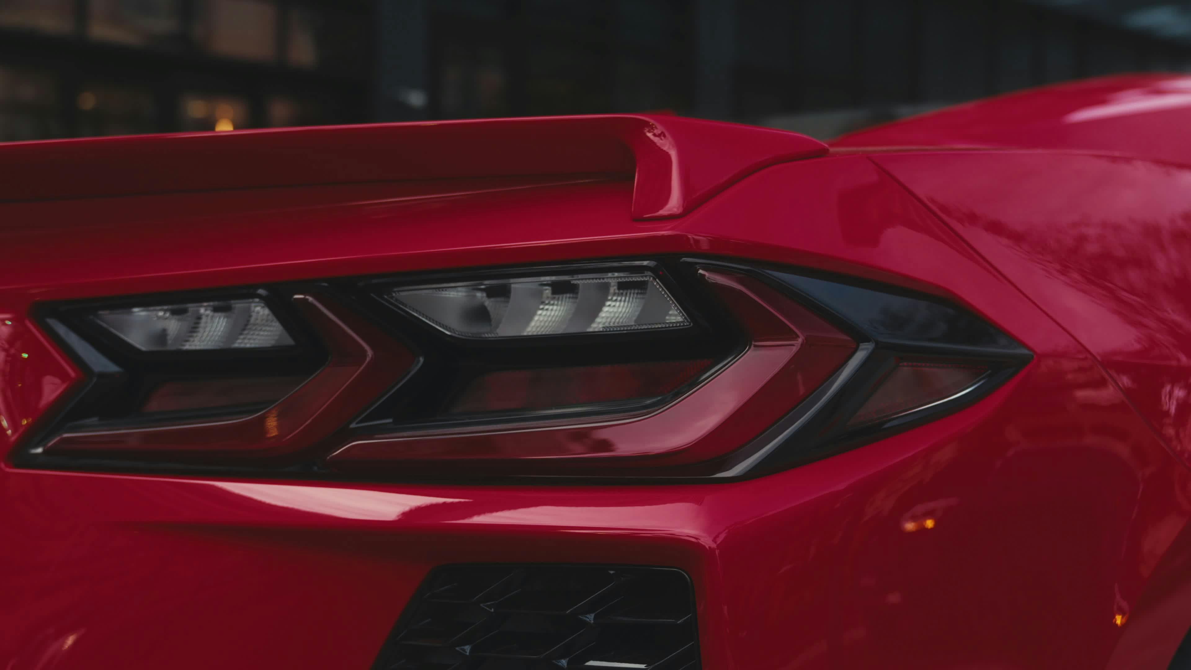 Sleek Red Sports Car Rear Highlighted in Modern Setting Free Stock ...