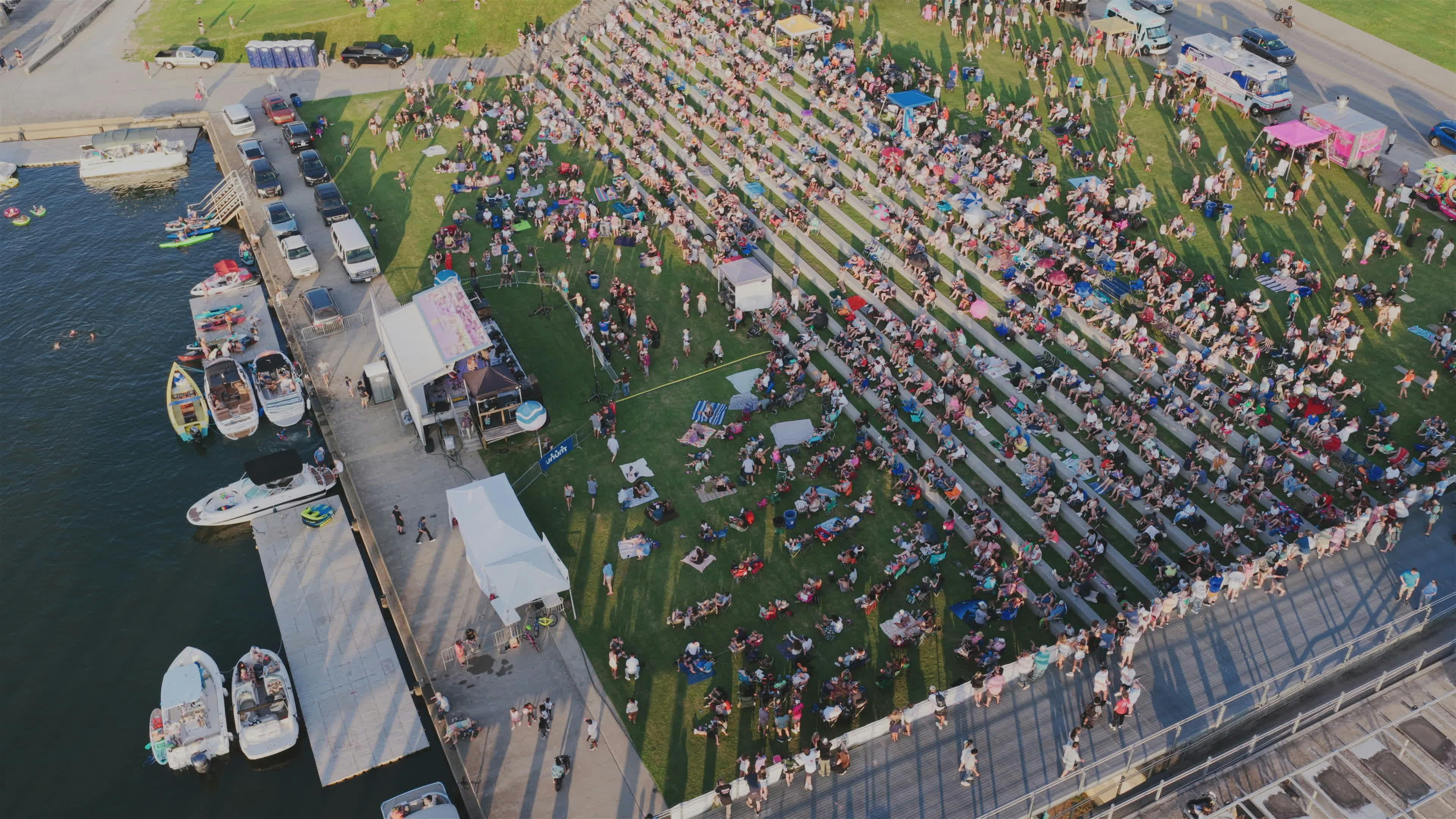 Aerial View of Crowded Outdoor Event by the River Free Stock Video ...