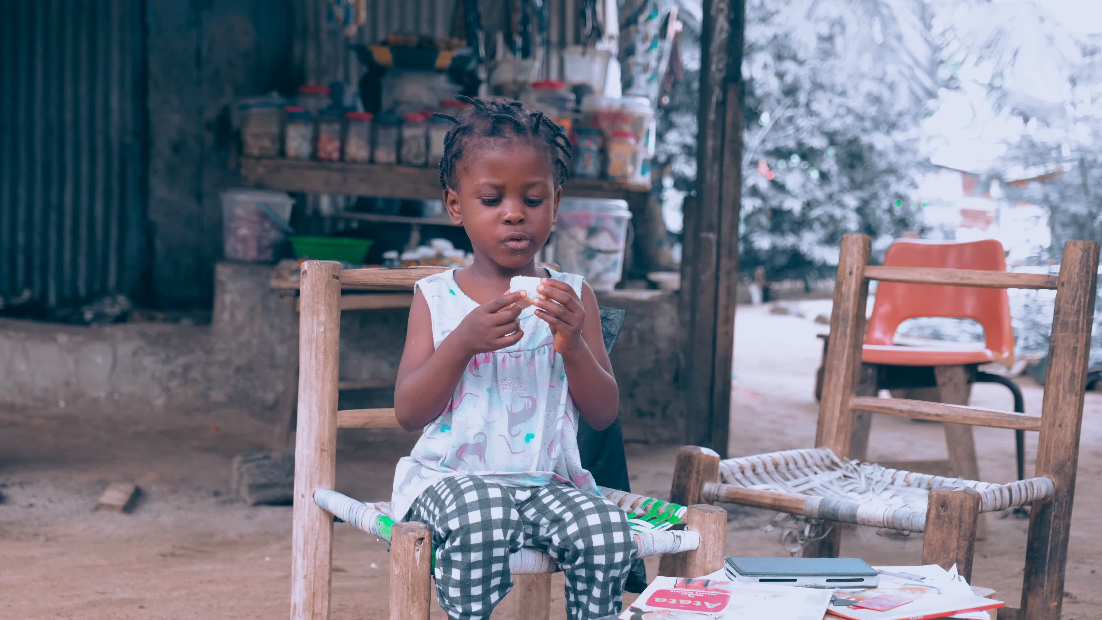 Young Girl Eating Snack in Rural Setting Free Stock Video Footage ...