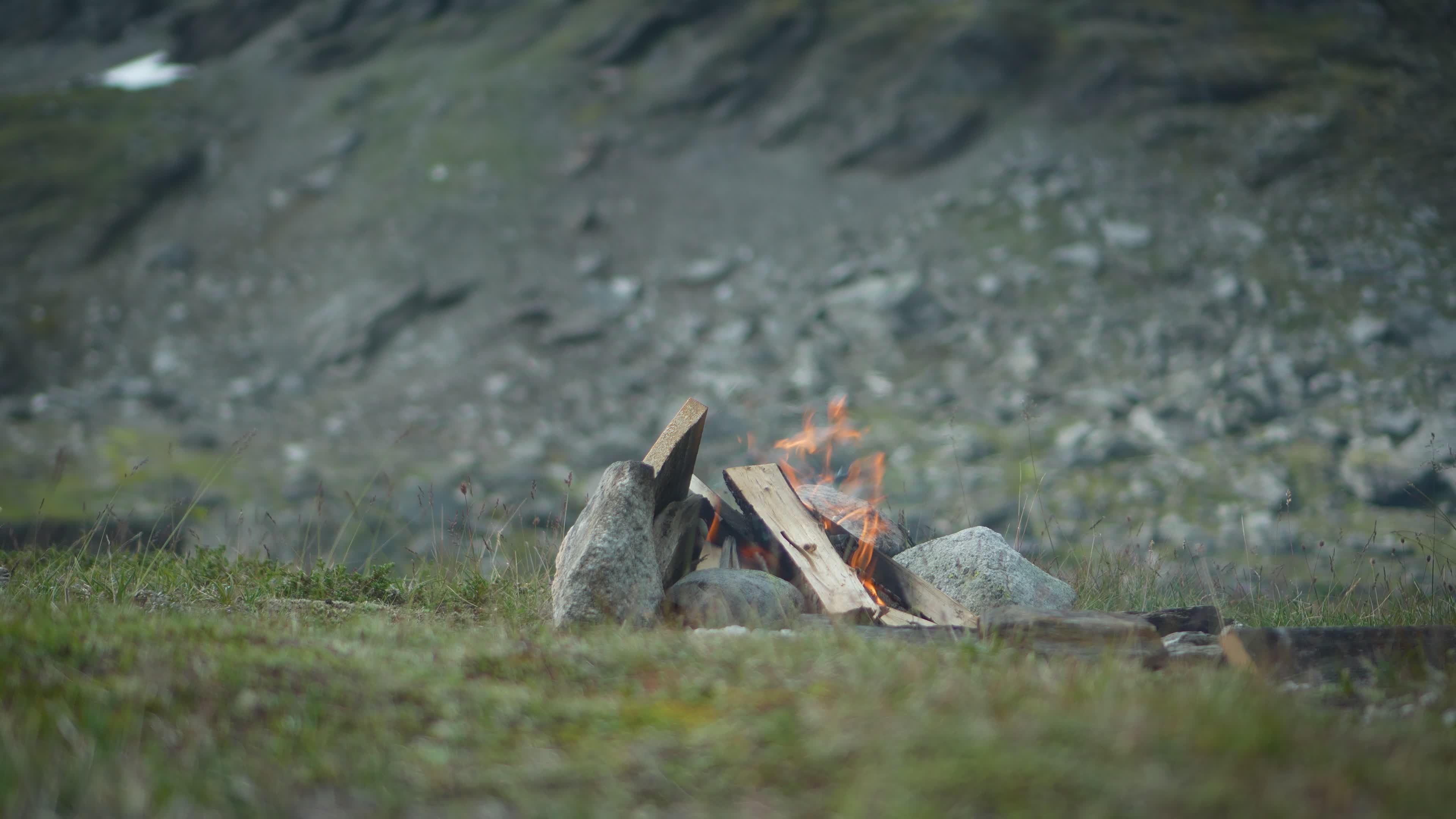 Serene Campfire Burning in Rocky Landscape Free Stock Video Footage ...