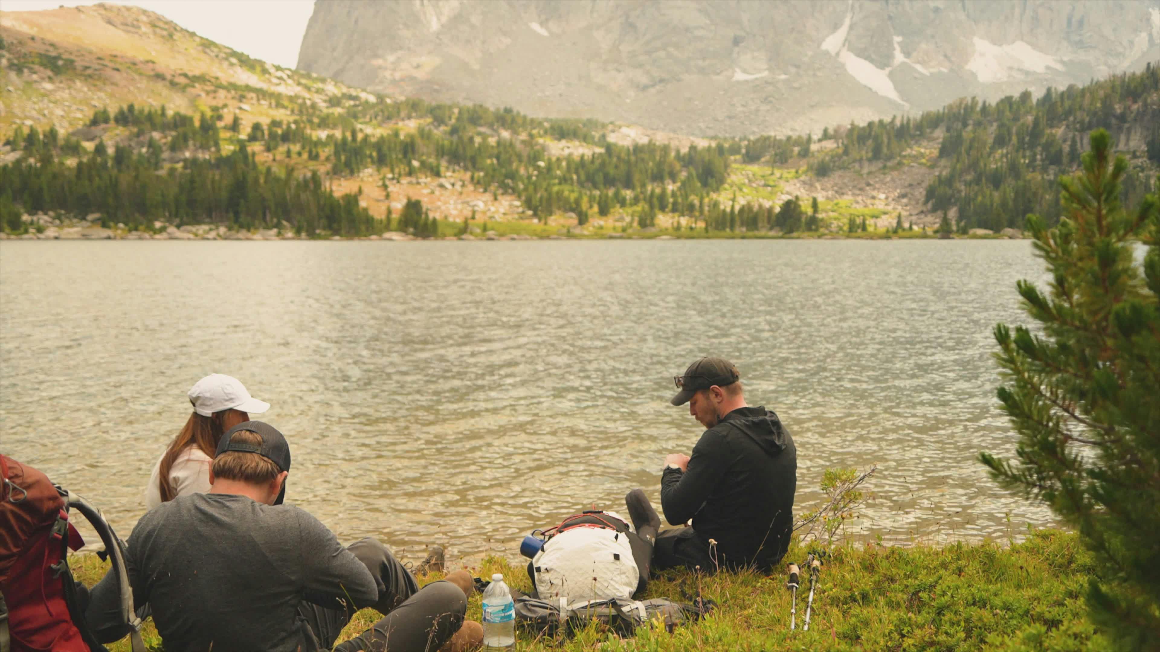 Tranquil Hiking Break by Scenic Mountain Lake Free Stock Video Footage ...