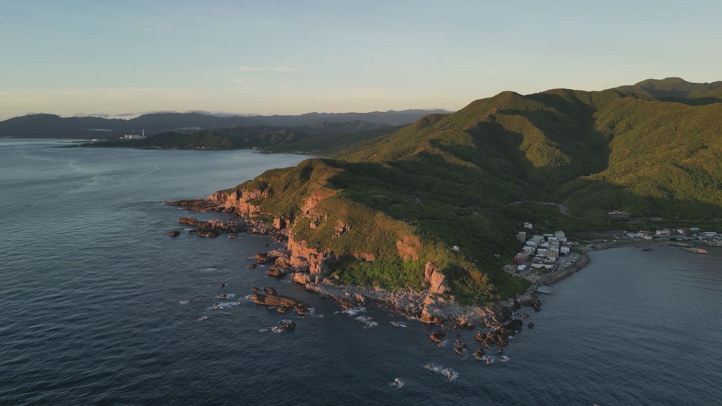 Stunning Aerial View of Coastal Terrain at Sunset Free Stock Video ...