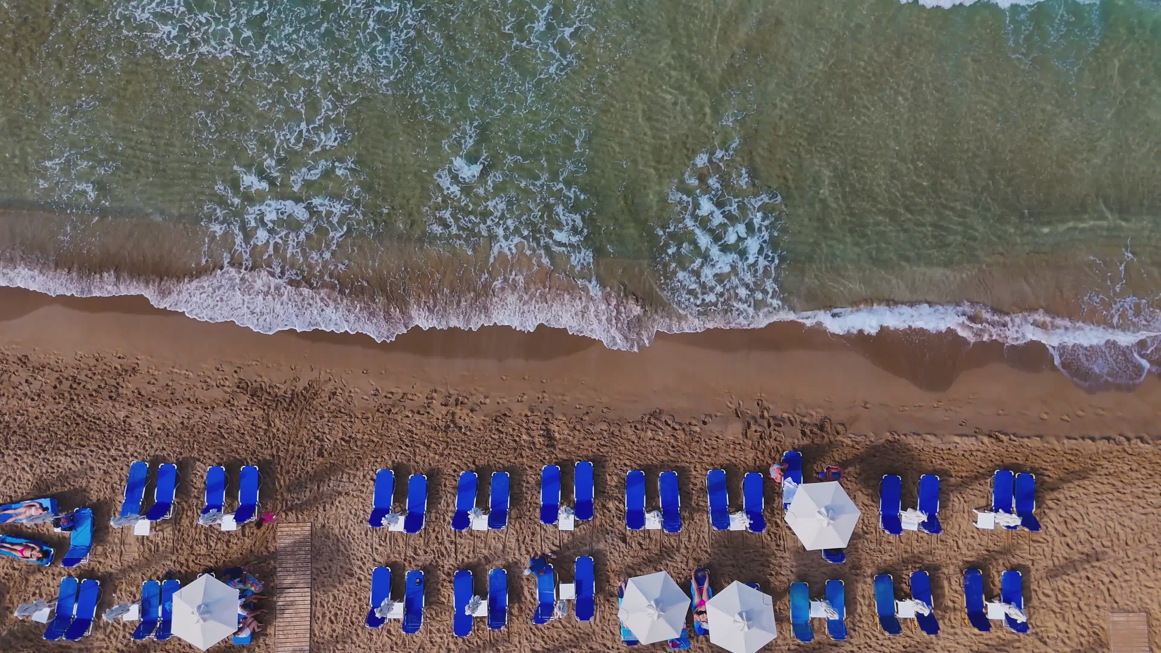 Aerial View of Glyfada Beach with Azure Waves Free Stock Video Footage ...