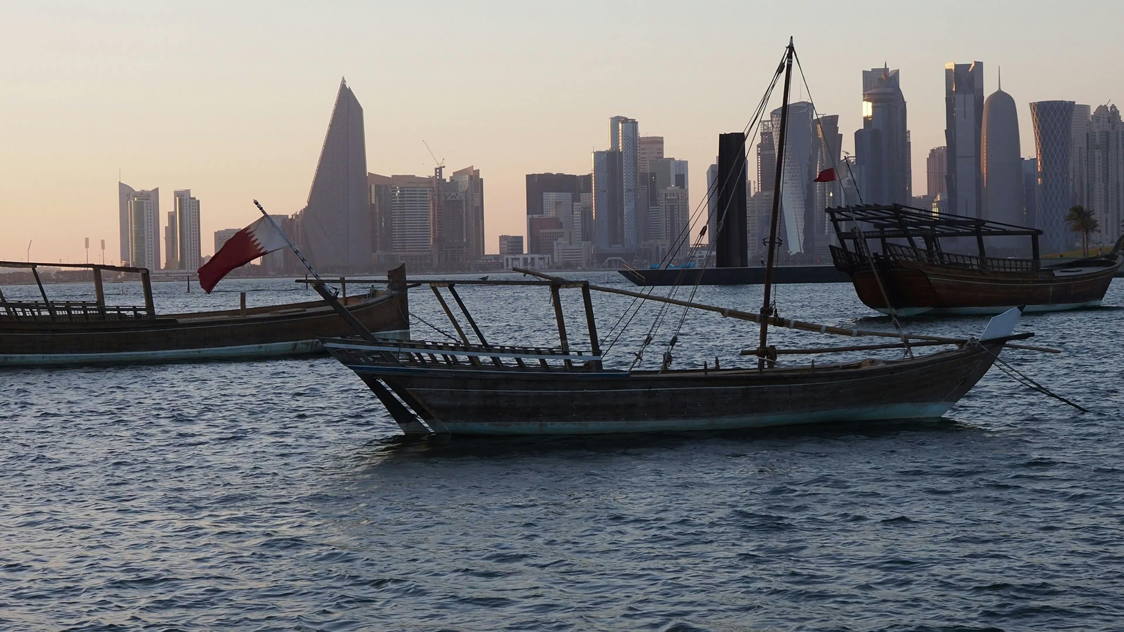 Serene Boats at Doha Skyline Sunset Free Stock Video Footage, Royalty-Free 4K & HD Video Clip