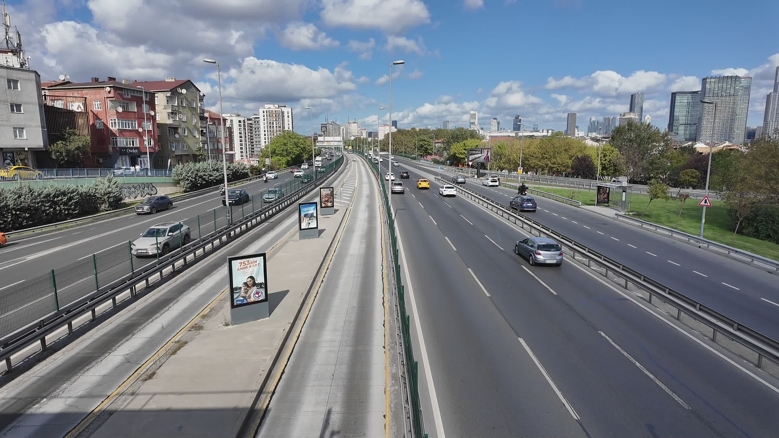Urban Highway Traffic in Cityscape under Blue Skies Free Stock Video ...