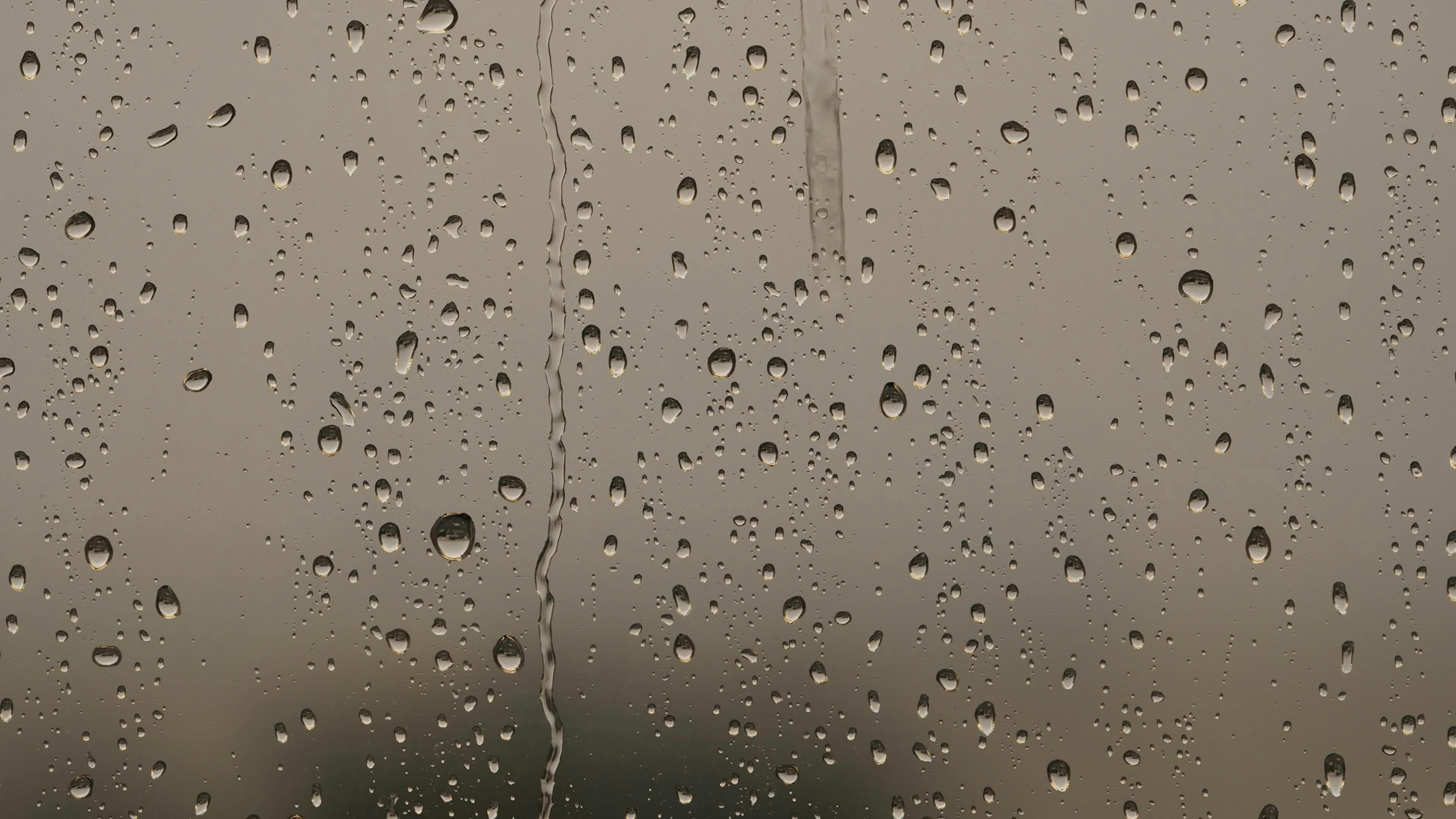 Raindrops on Window with Moody Sky Background Free Stock Video Footage ...